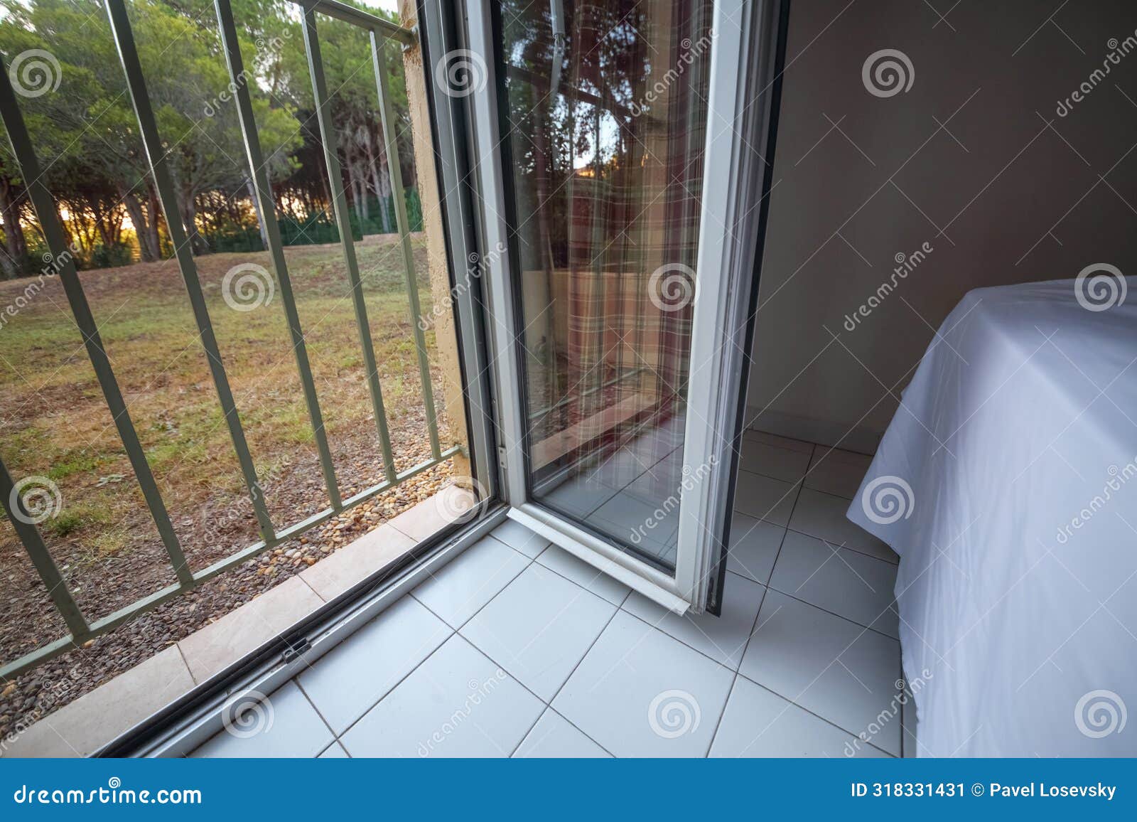 Comfortable Hotel Room with an Open French Window Stock Image - Image ...