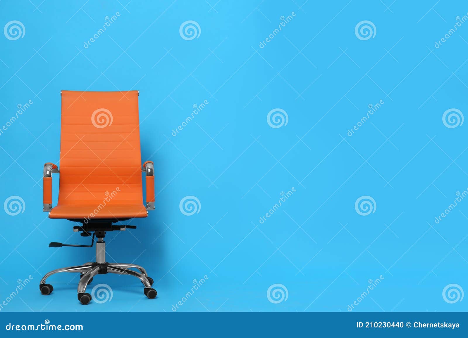 Comfortable Office Chair on Light Blue Background, Space for Text Stock ...