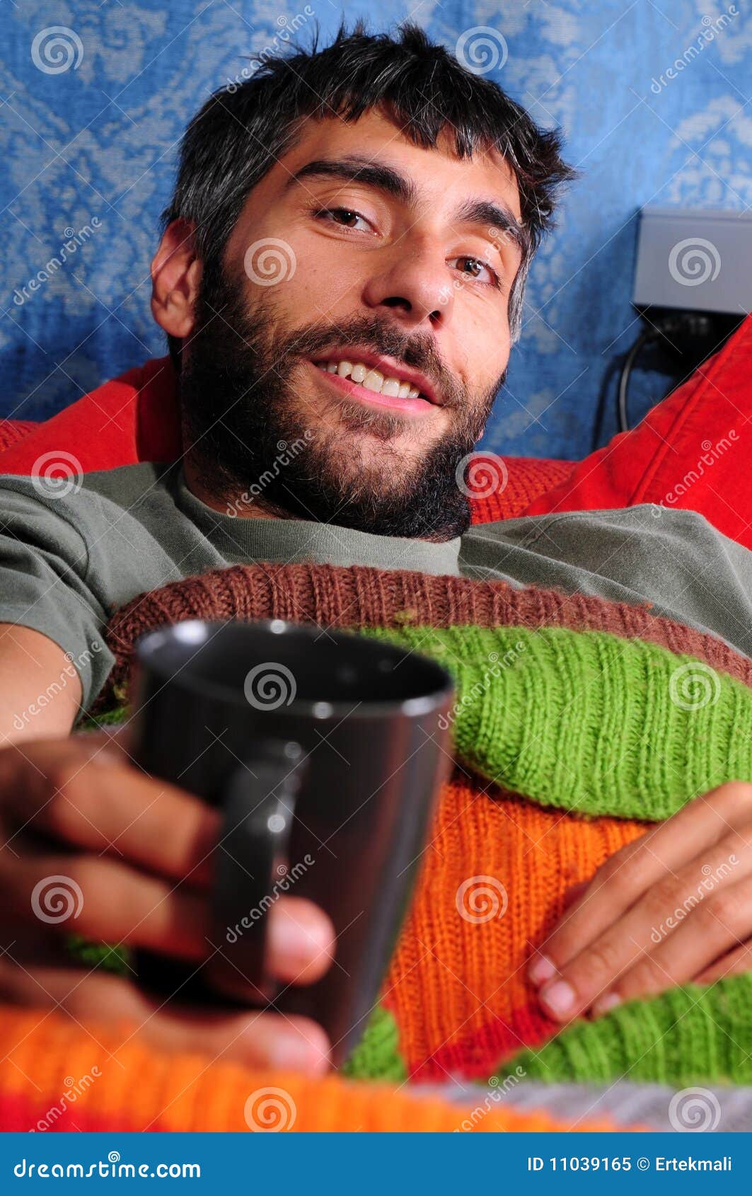 Comfy Man on the Couch Offering His Mug Stock Image - Image of person ...