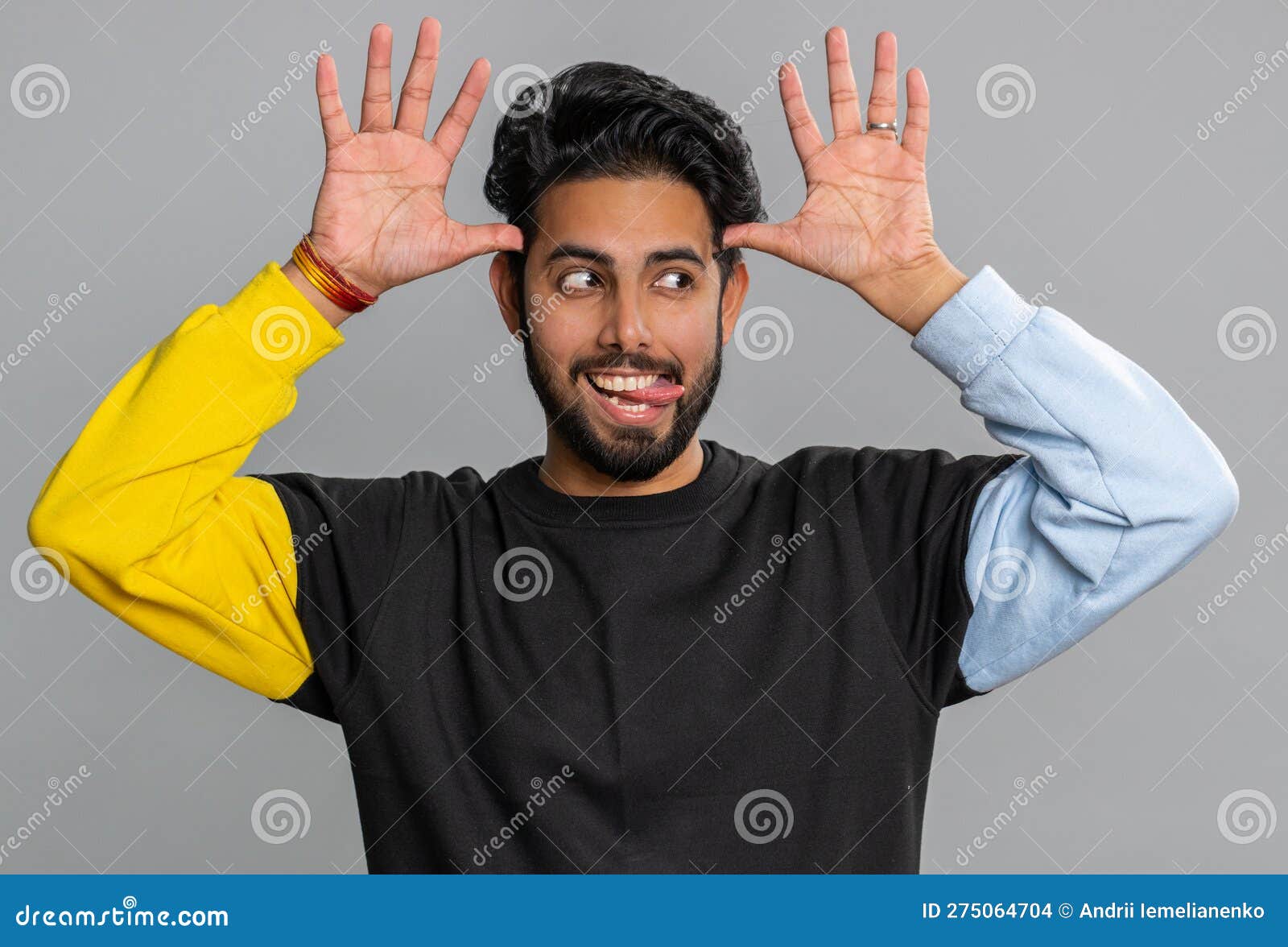 Comical Funny Indian Man Making Playful Silly Facial Expressions
