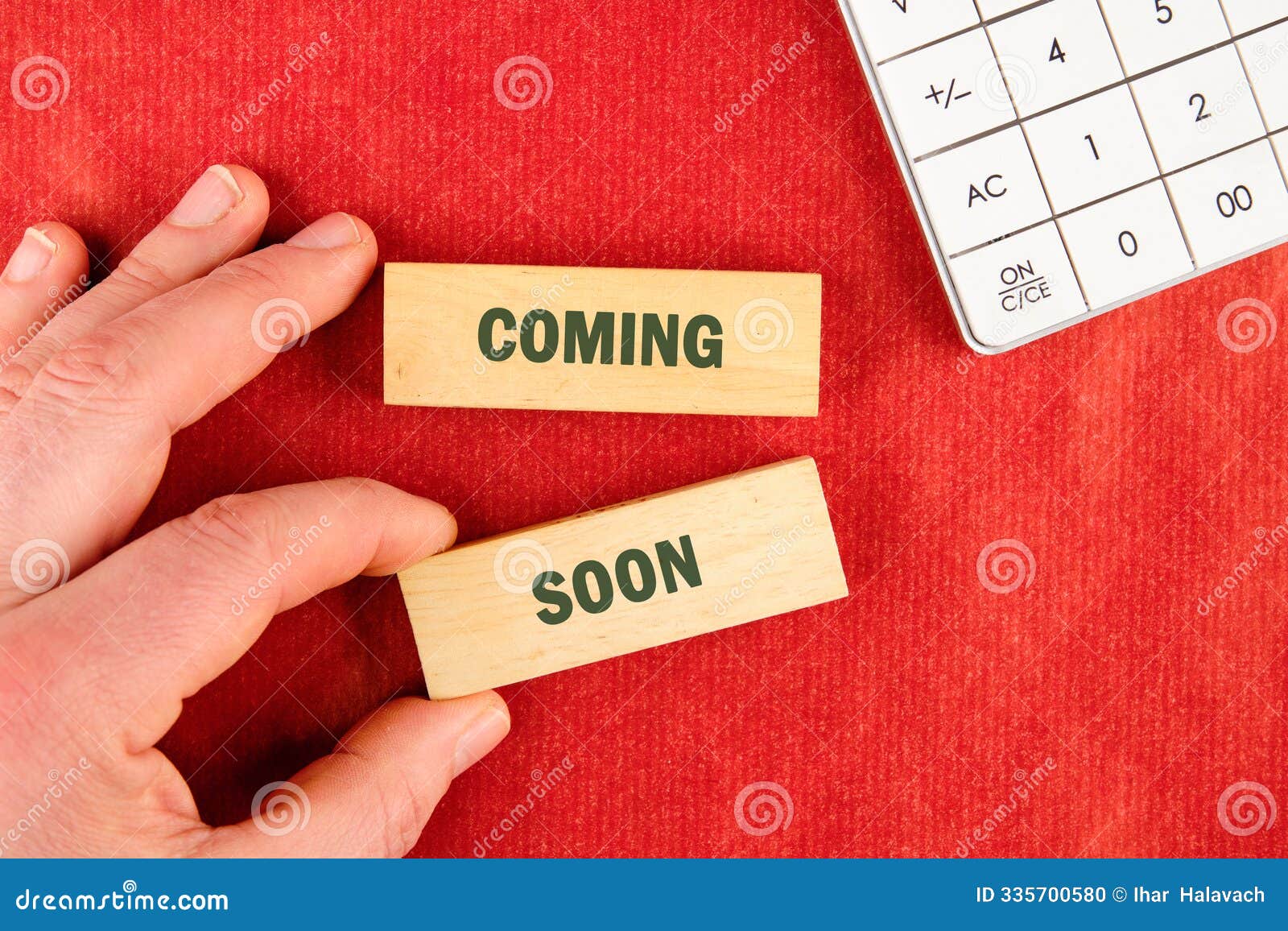 Coming Soon Text Written Made Up of Blocks with the Help of a Hand on a ...