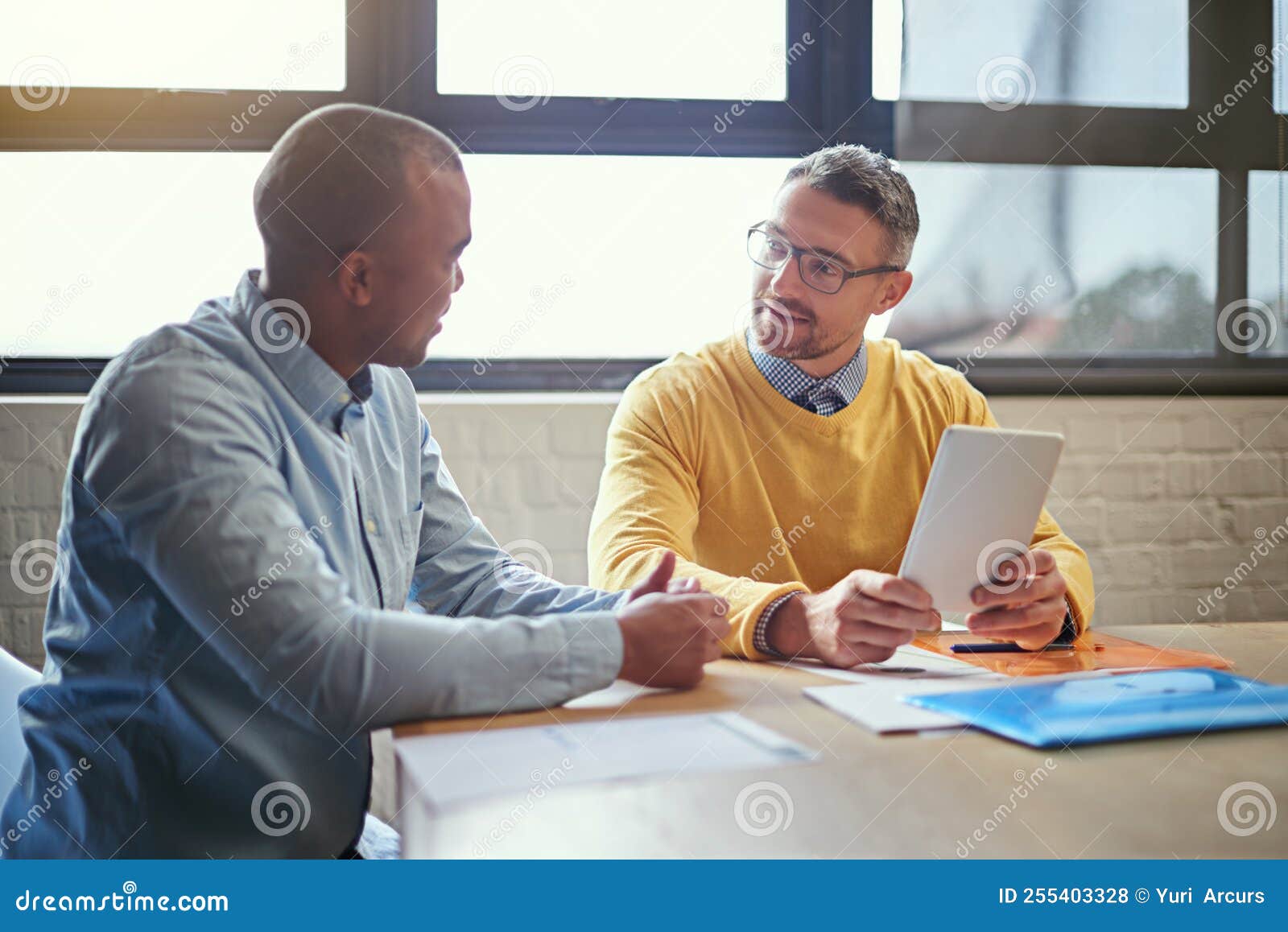 Coming Up with Creative Business Solutions Together. Two Designers ...