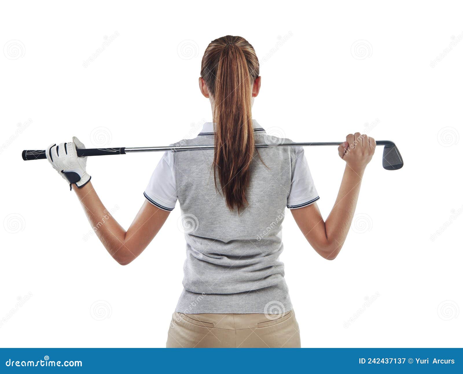 In Command of Her Club. Studio Shot of a Young Golfer Holding a Golf ...