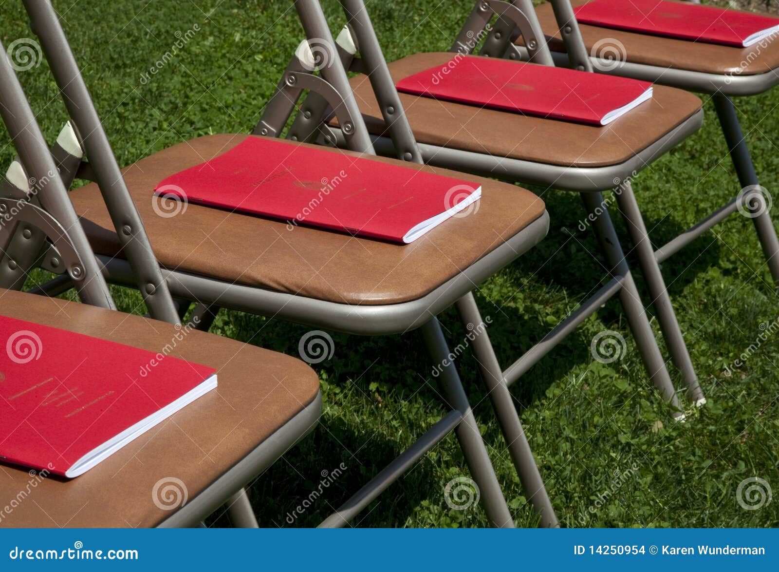 Commencement Programs on Chairs Stock Photo - Image of exercises ...