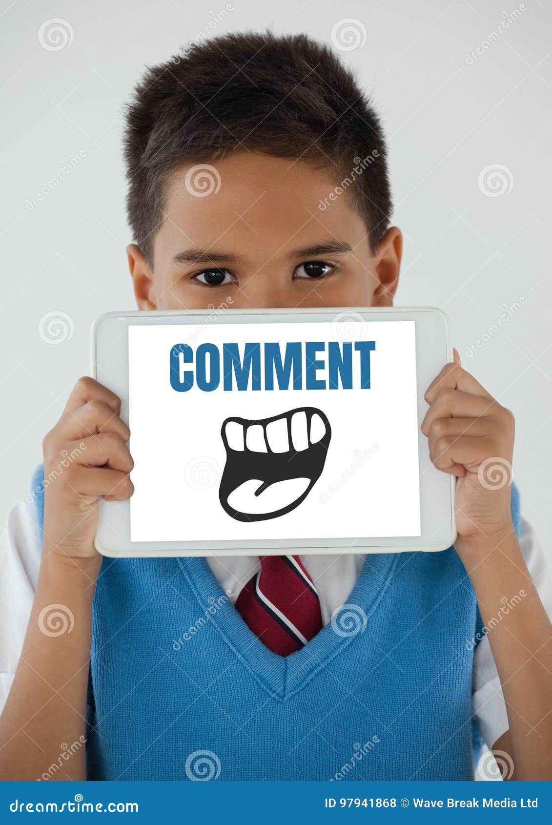 Comment Text and Cartoon Mouth Graphic on Tablet Screen with Boy Stock ...