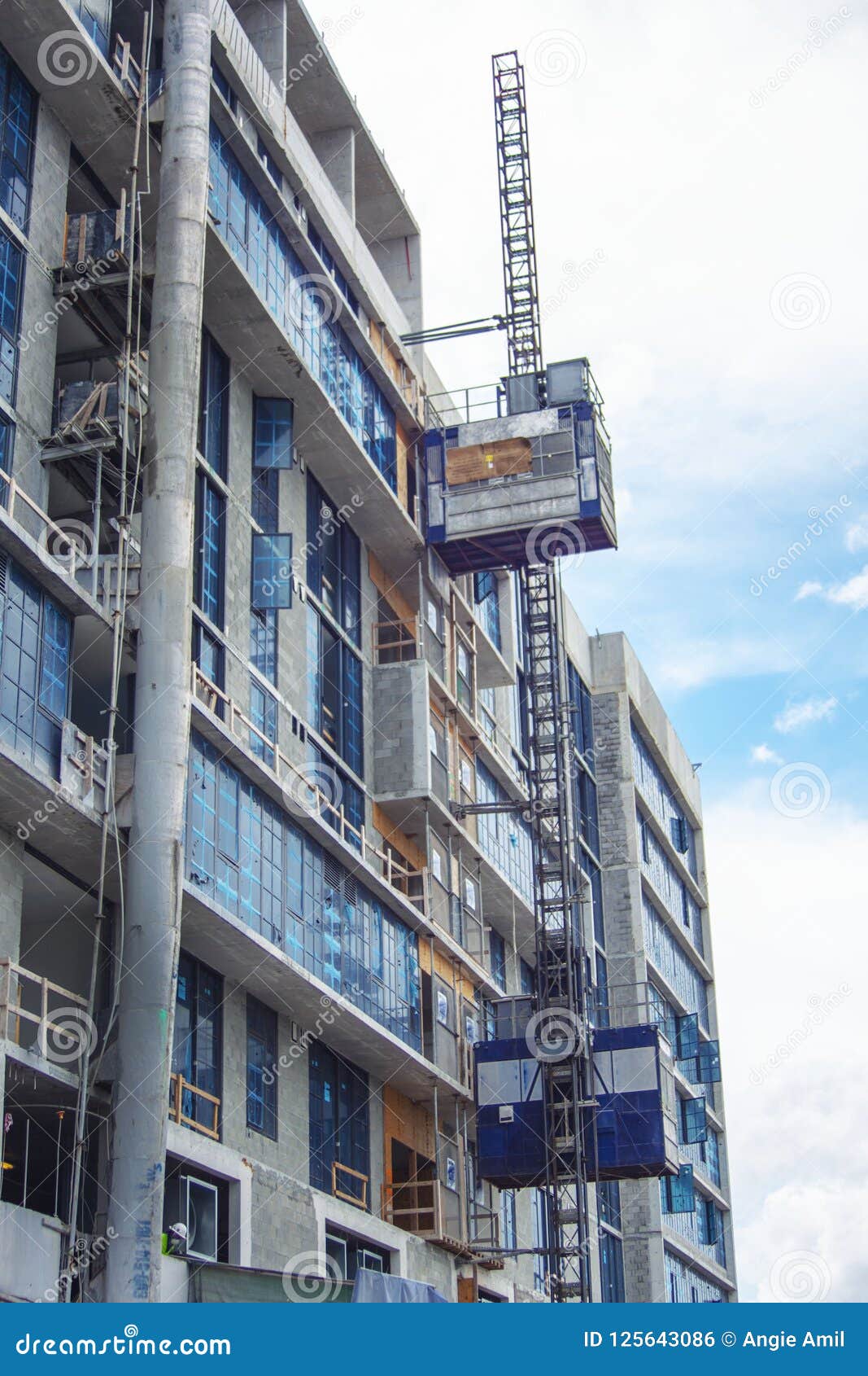 Commercial Construction Site with Elevator Editorial Photo - Image of ...