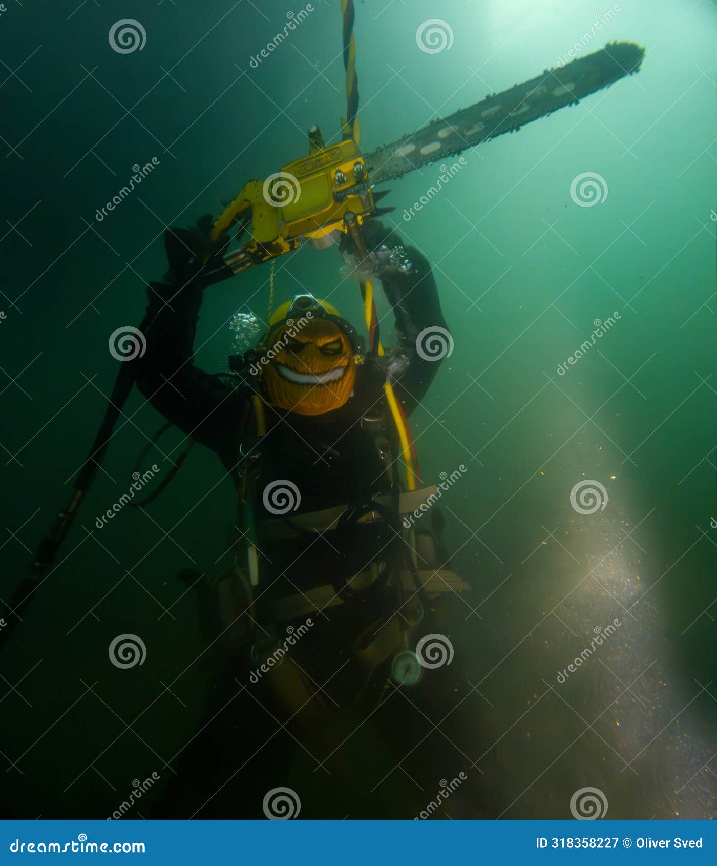 Commercial Diver Cutting Log Underwater with Chainsaw Stock Image ...
