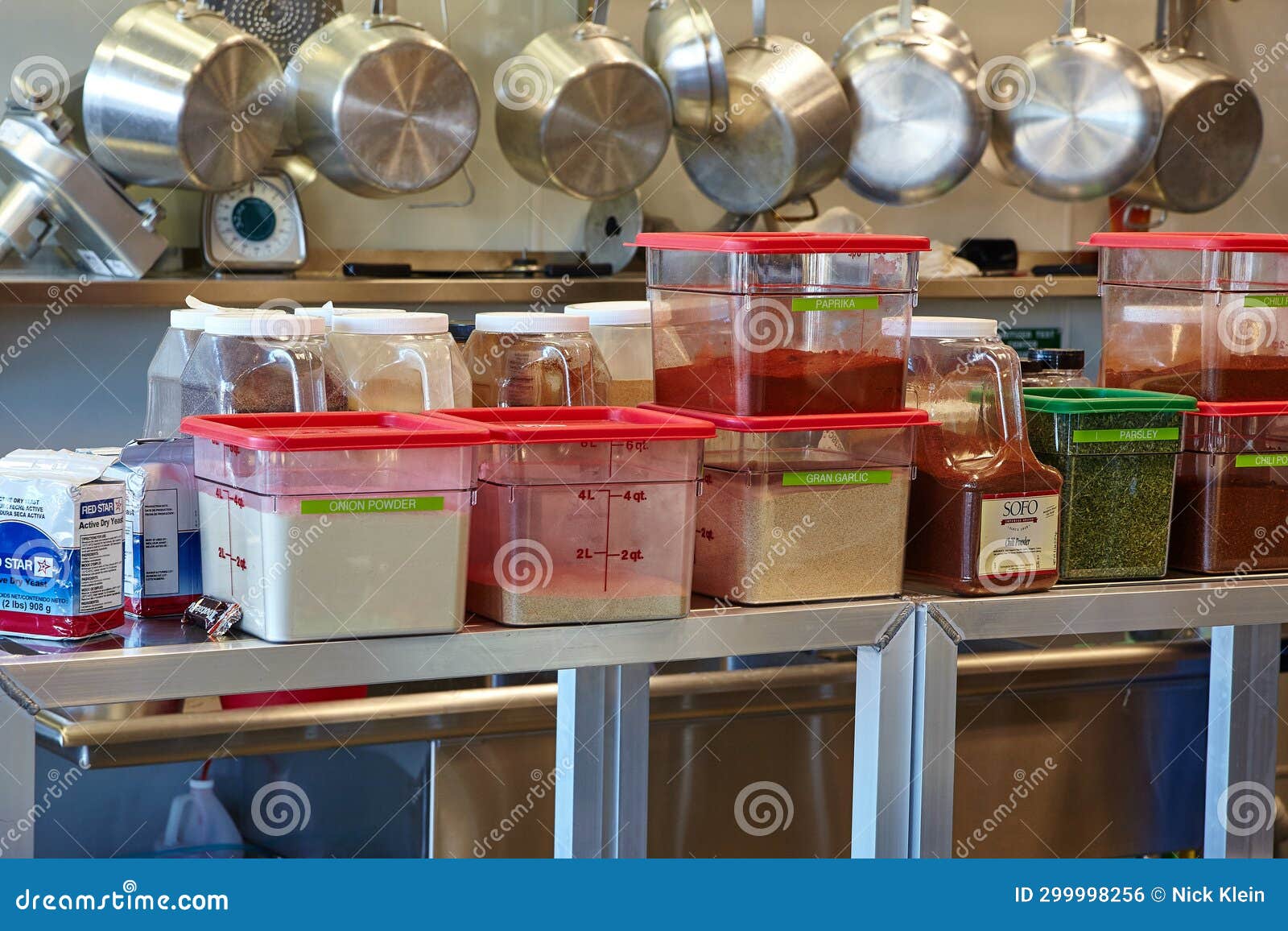 Commercial Kitchen Ingredient Storage and Cookware Setup Stock Photo ...
