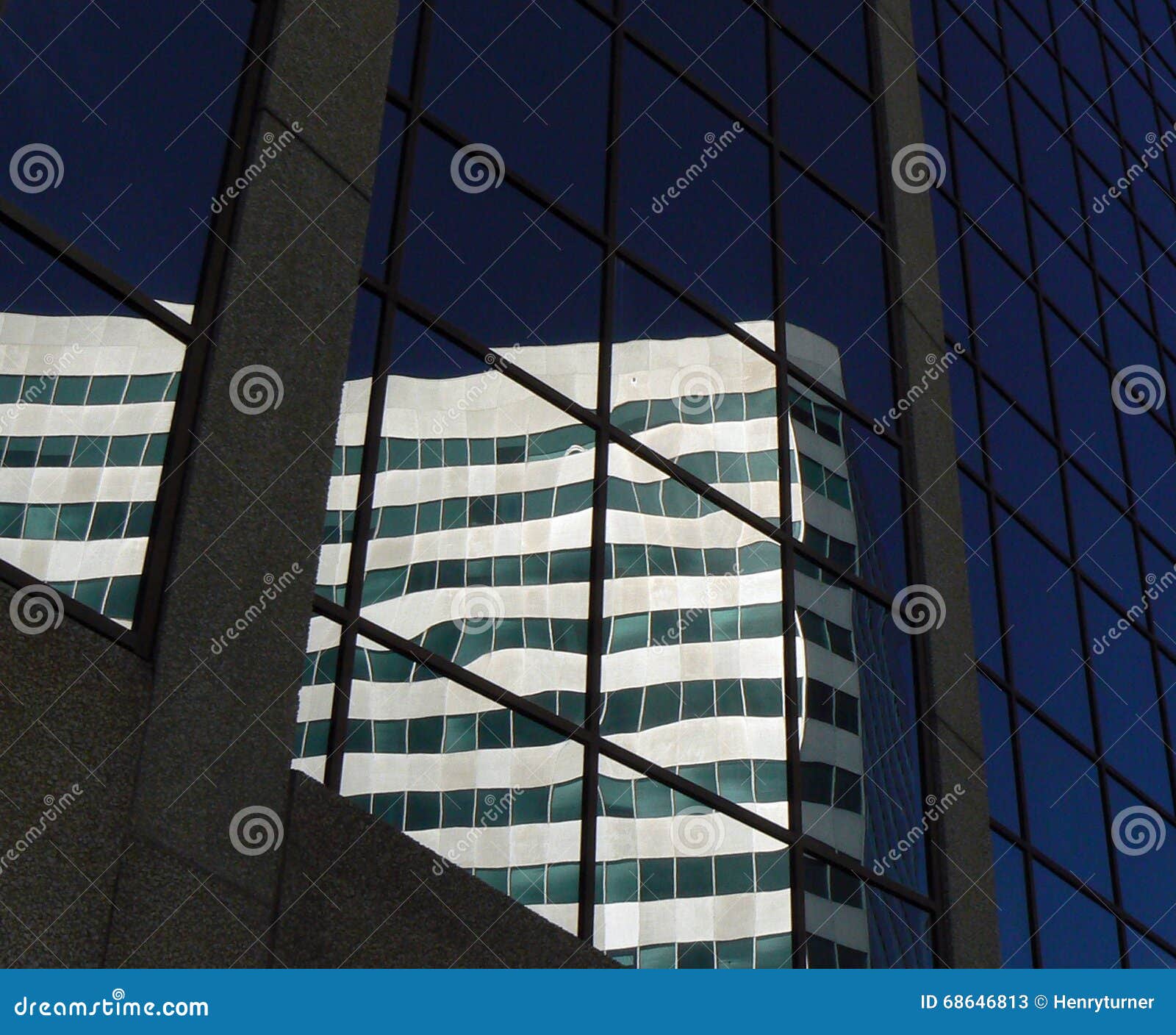 Distorted Reflections Of Skyscrapers In The Glass Facade Of A Modern ...