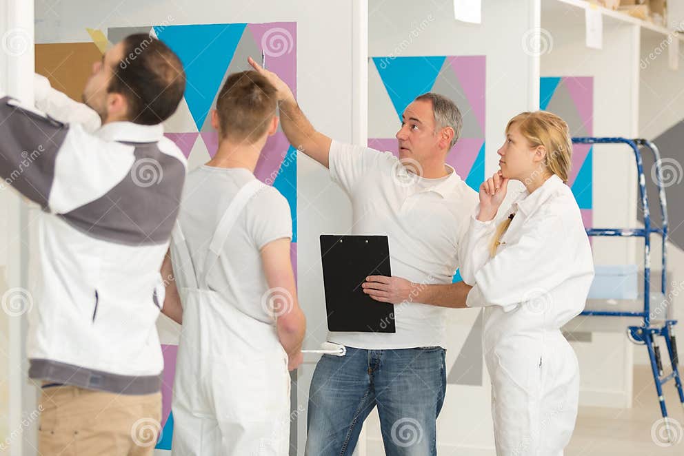 Commercial Painting Apprentice Studying Wall Design Stock Photo - Image ...