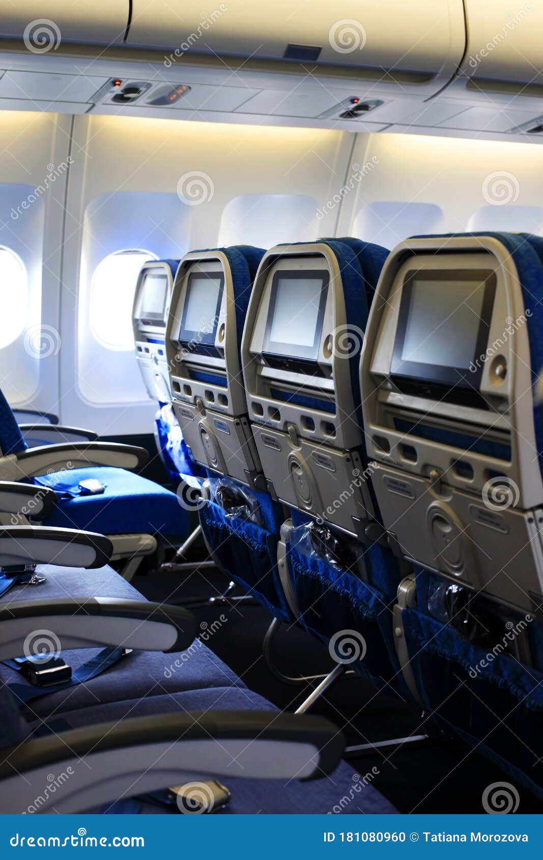 Passenger Aircraft Cabin stock photo. Image of cabin - 181080960