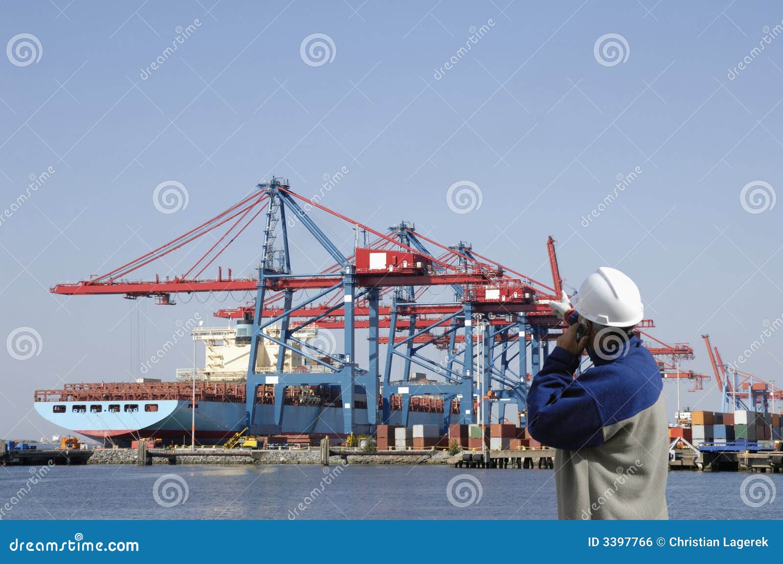 Port Engineer Talking On The Walkie-talkie For Controlling Loading ...