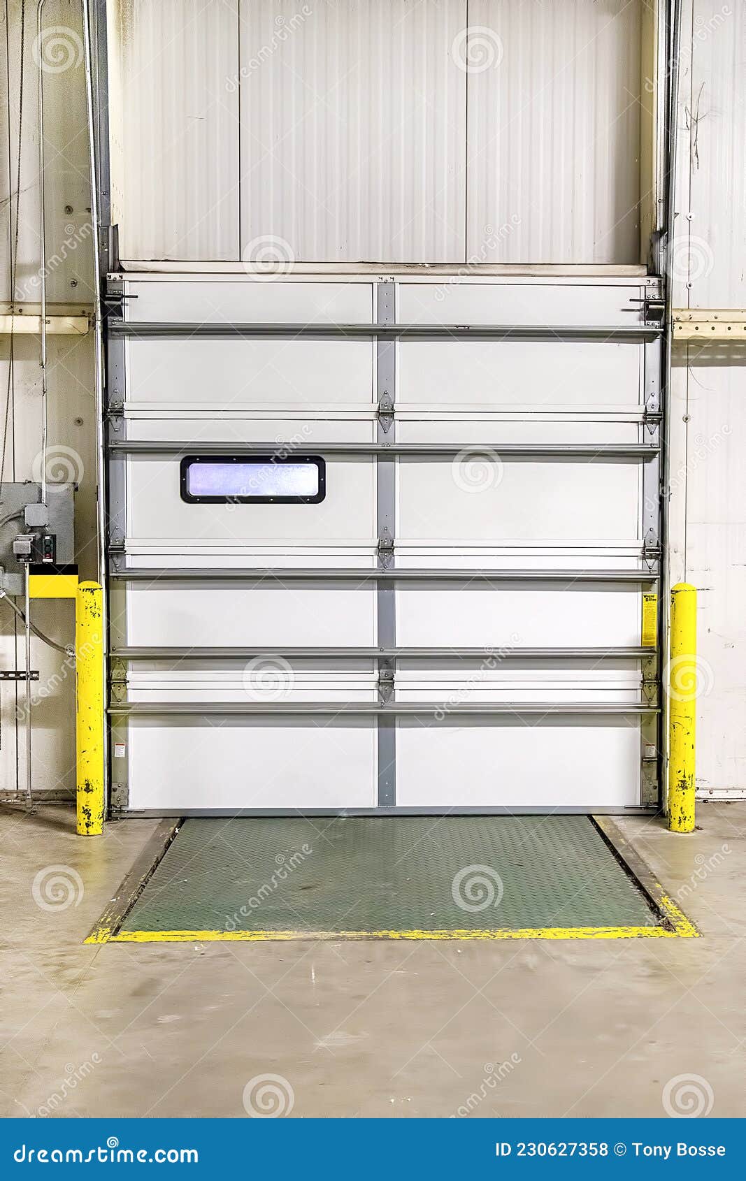 Commercial Receiving Door with Crank Stock Photo - Image of delivery ...