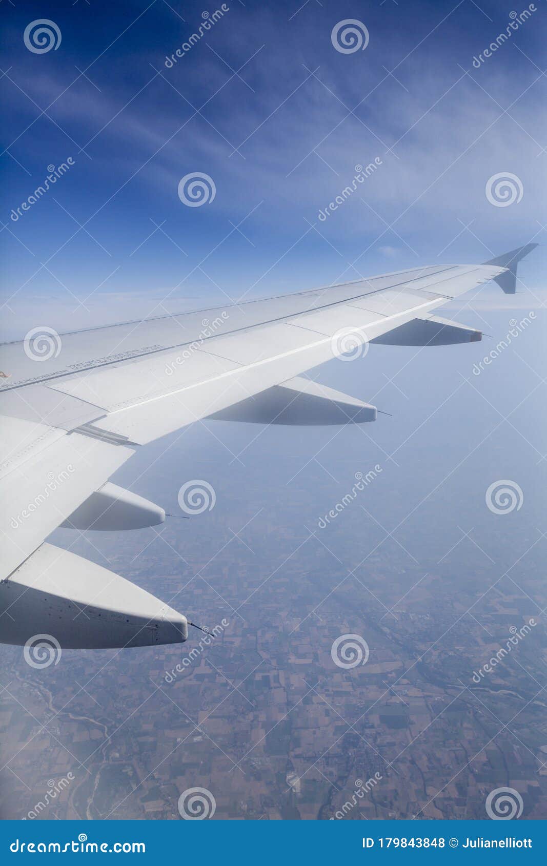 Commerical plane in flight stock photo. Image of altitude - 179843848