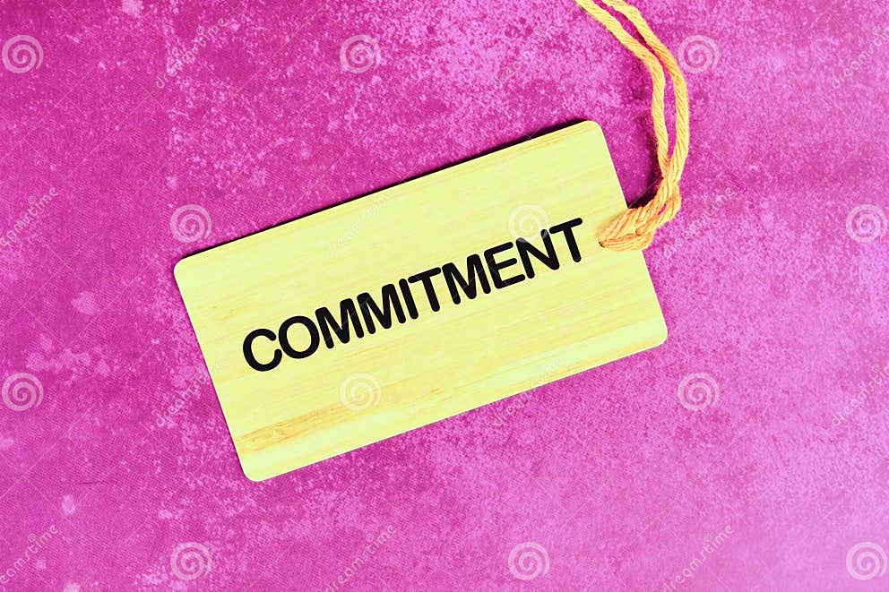 COMMITMENT Word Written on the Card on an Abstract Bright Background ...