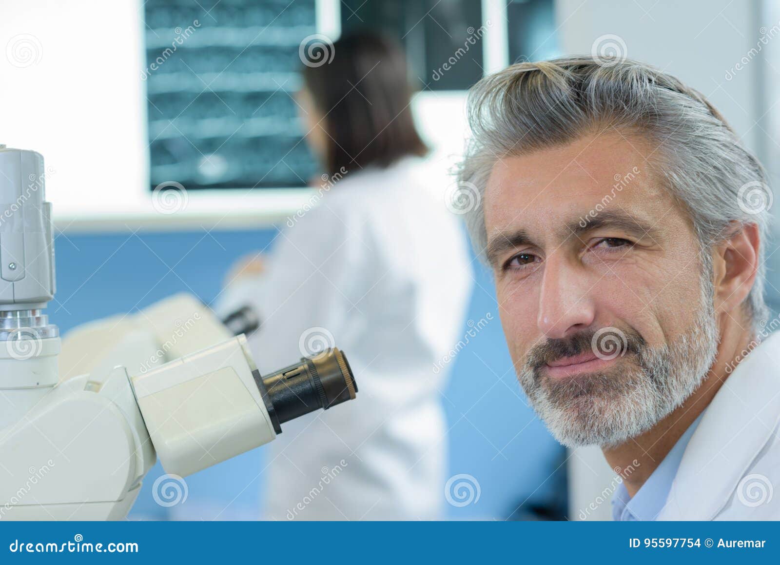 Committed To Find The Cure. Girl In Chemistry Class With Testing Tube ...