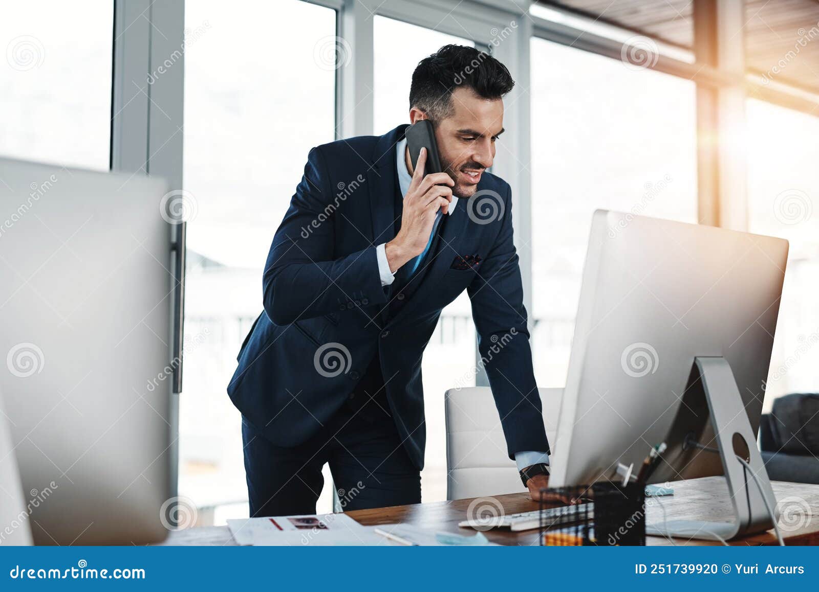 Committed To Getting the Job Done. a Handsome Male Executive Working in ...