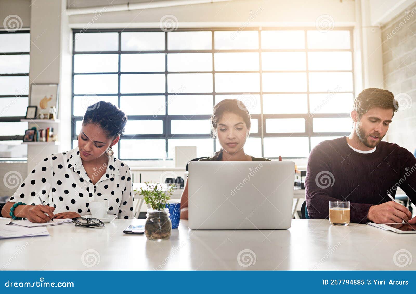 100 Committed To Their Work Assignments. a Team of Colleagues Working ...