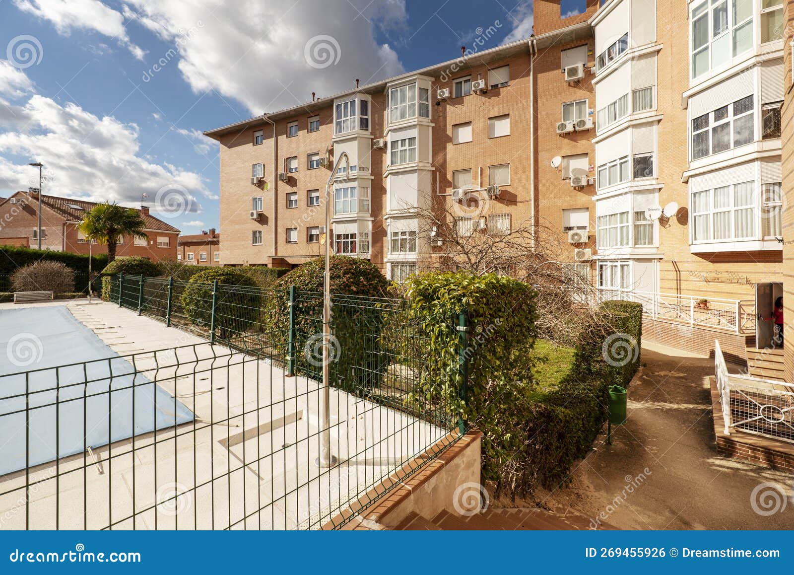 Common Areas with a Pool Covered by a Canvas in an Urbanization with ...