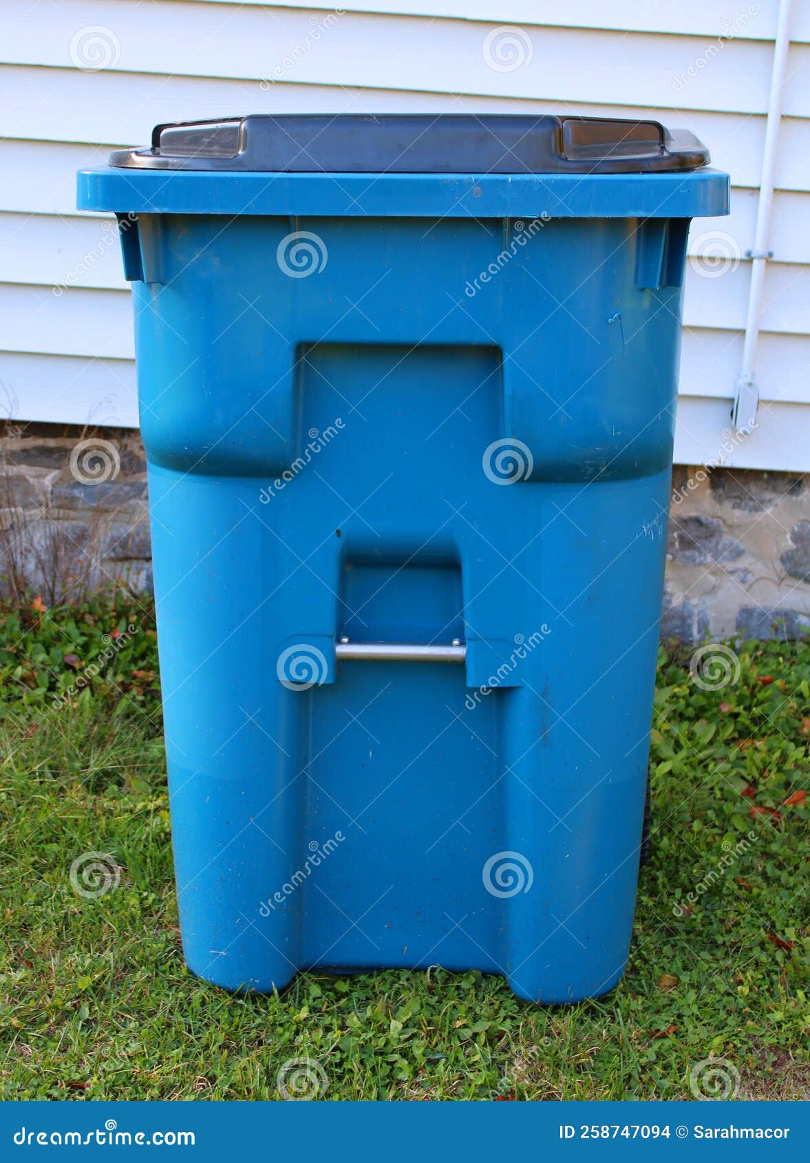 A Common Blue Plastic Trash Bin Stock Photo - Image of disposal ...