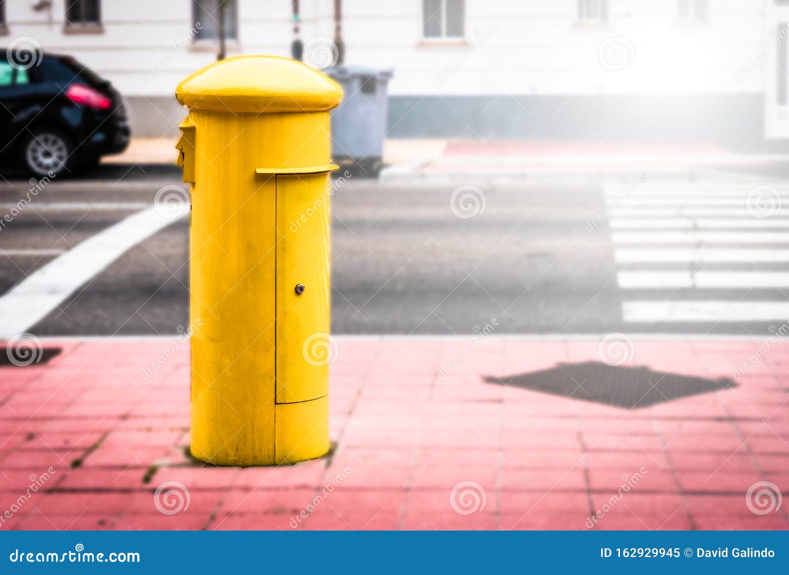 Common Yellow Postbox on a City Street Stock Image - Image of delivery ...