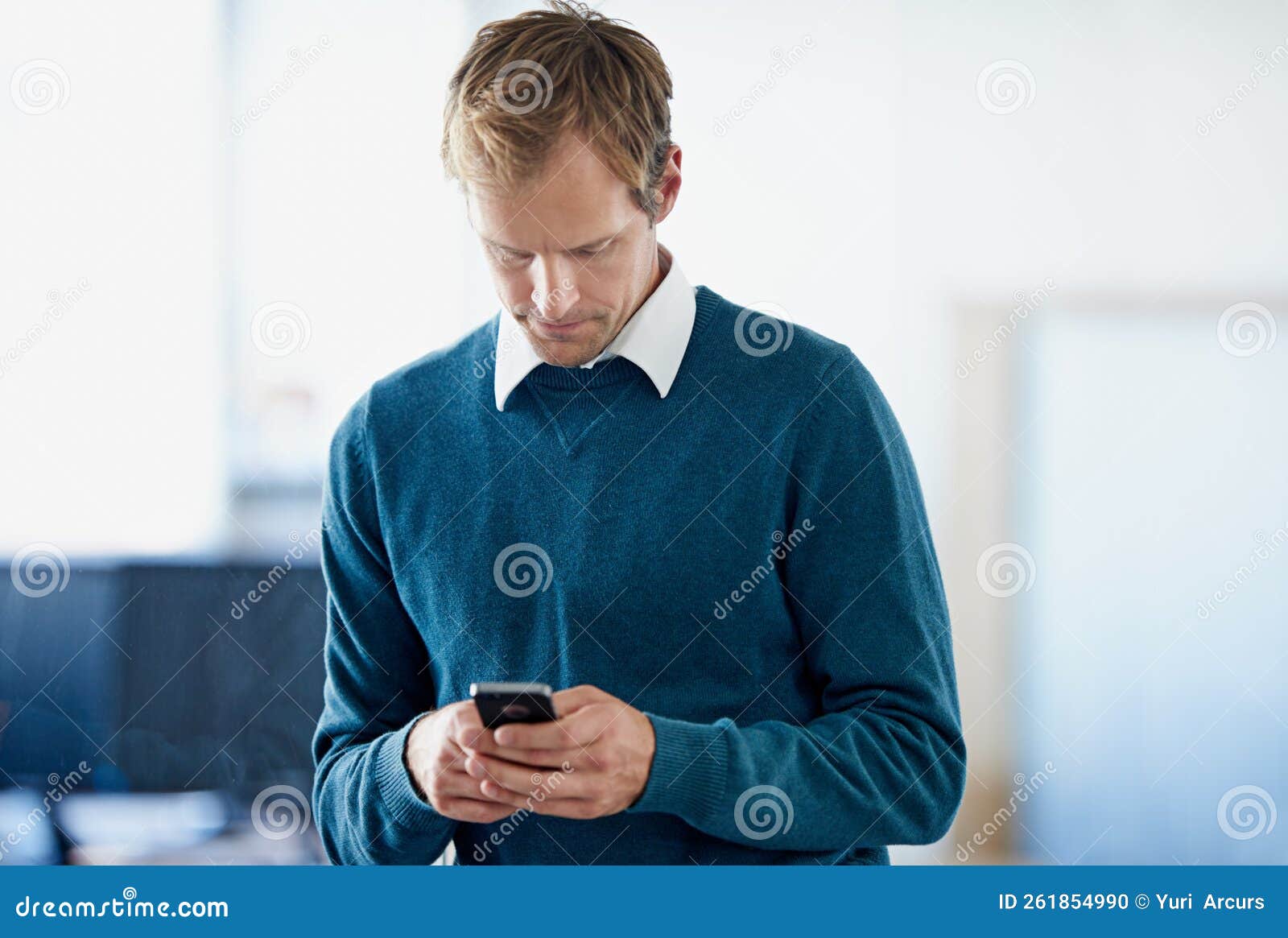Communicating with Clients. a Young Businessman Sending a Text Message ...