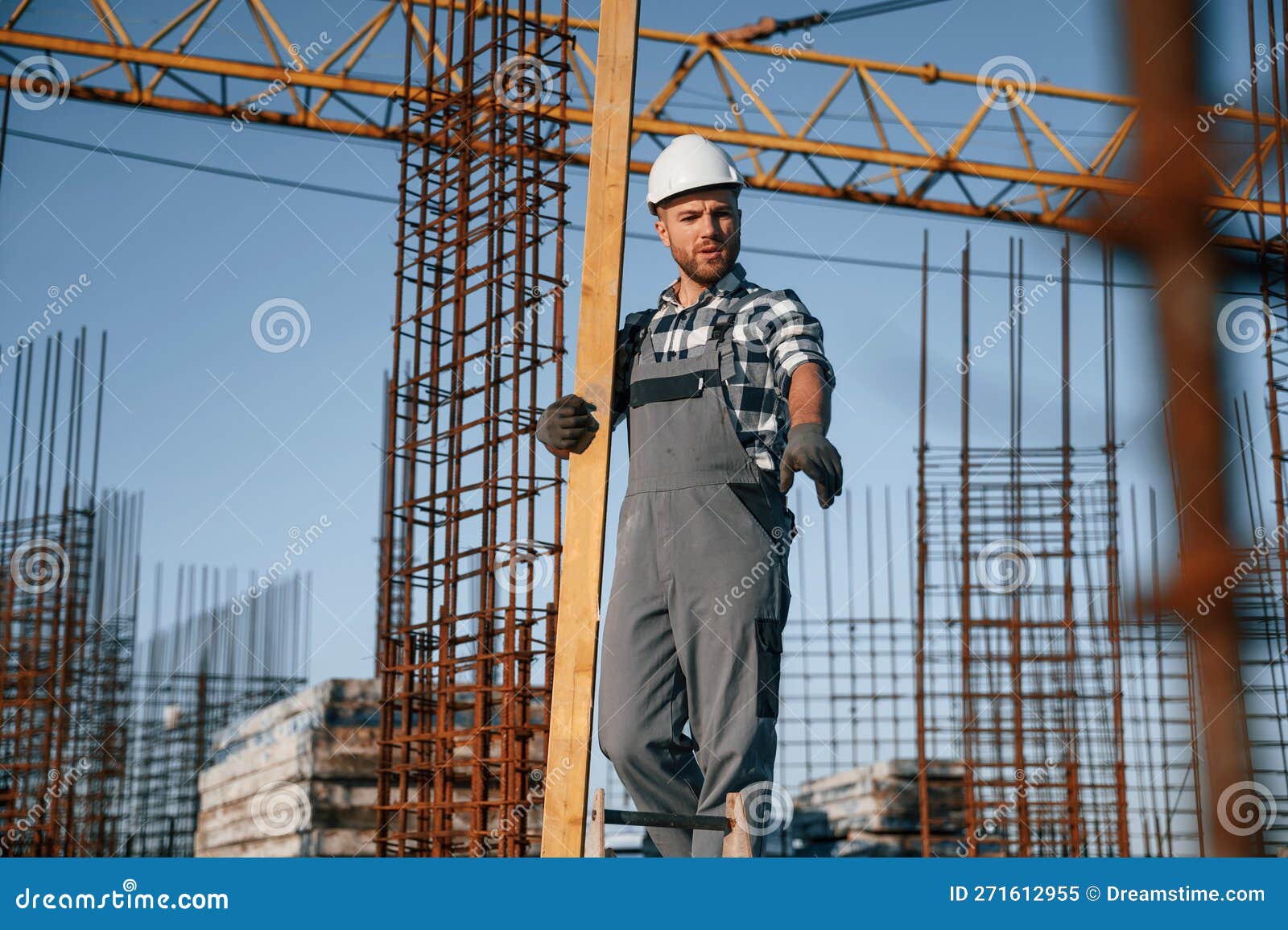 Communicating with Other People. Man is Working on the Construction ...