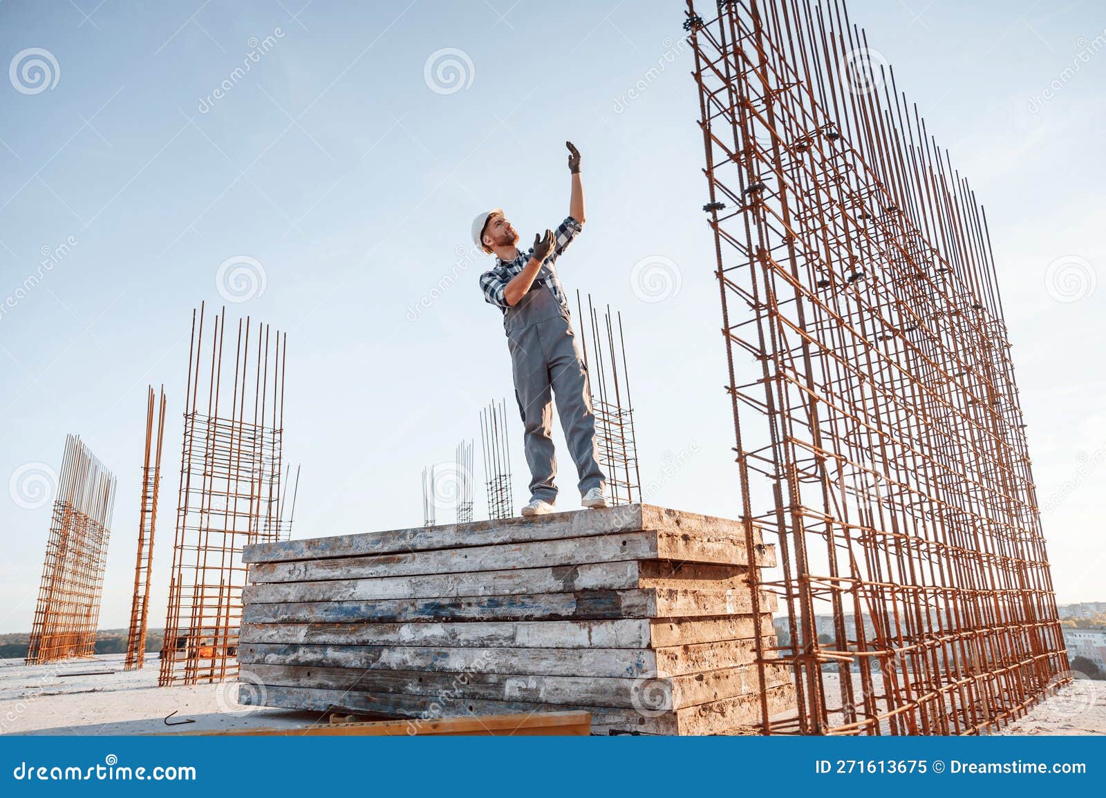 Communicating with Other People. Man is Working on the Construction ...