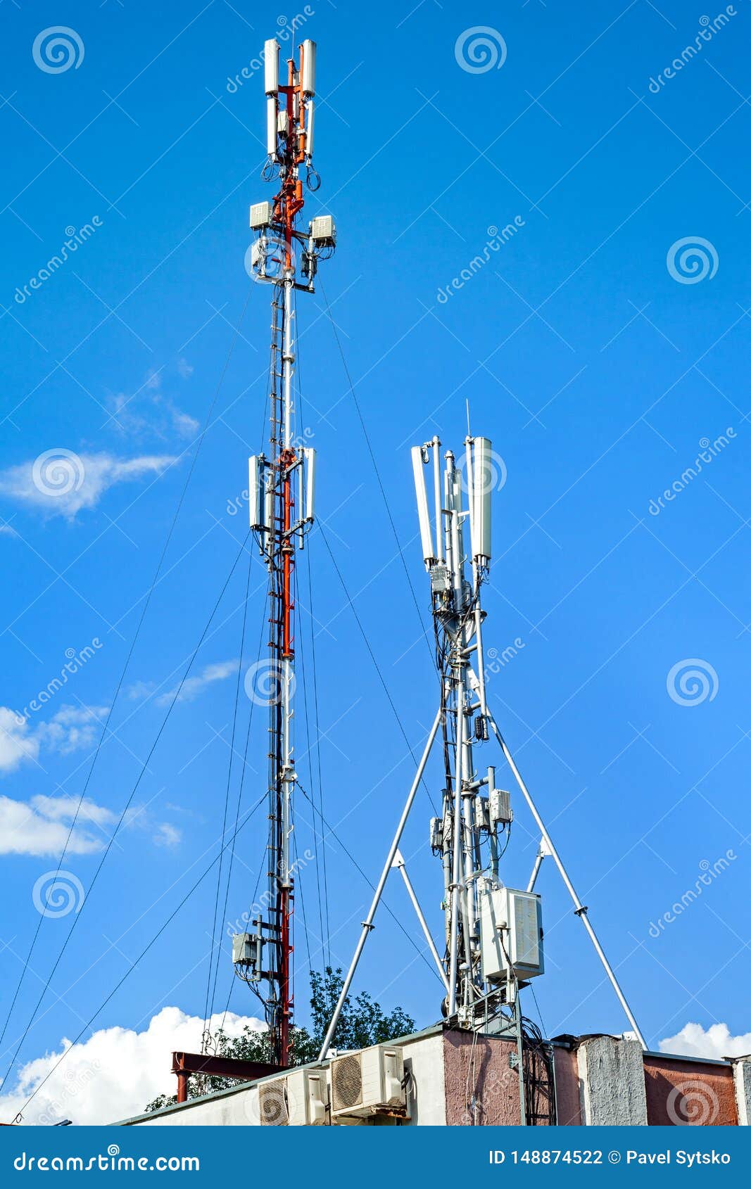 Communication Antennas on a Building, Against Blue Sky. Stock Photo ...