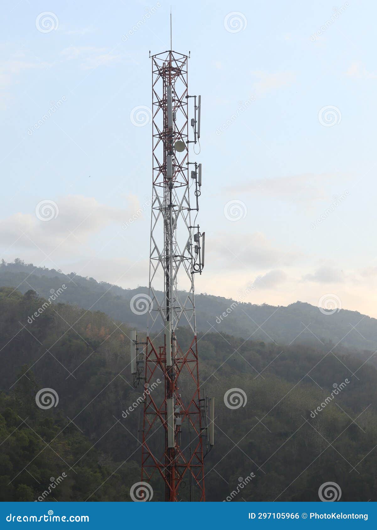 Communication Building Antenna with a Backdrop of Mountains and Sky ...