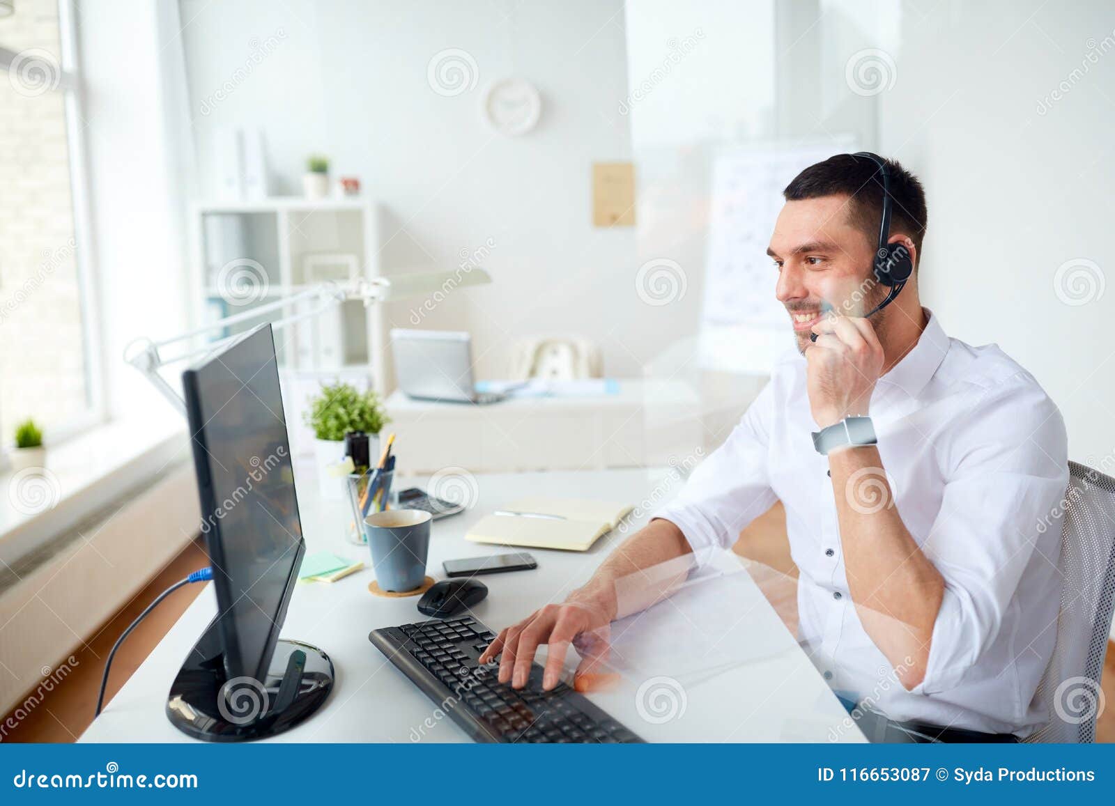 Businessman with Headset and Computer at Office Stock Image - Image of ...