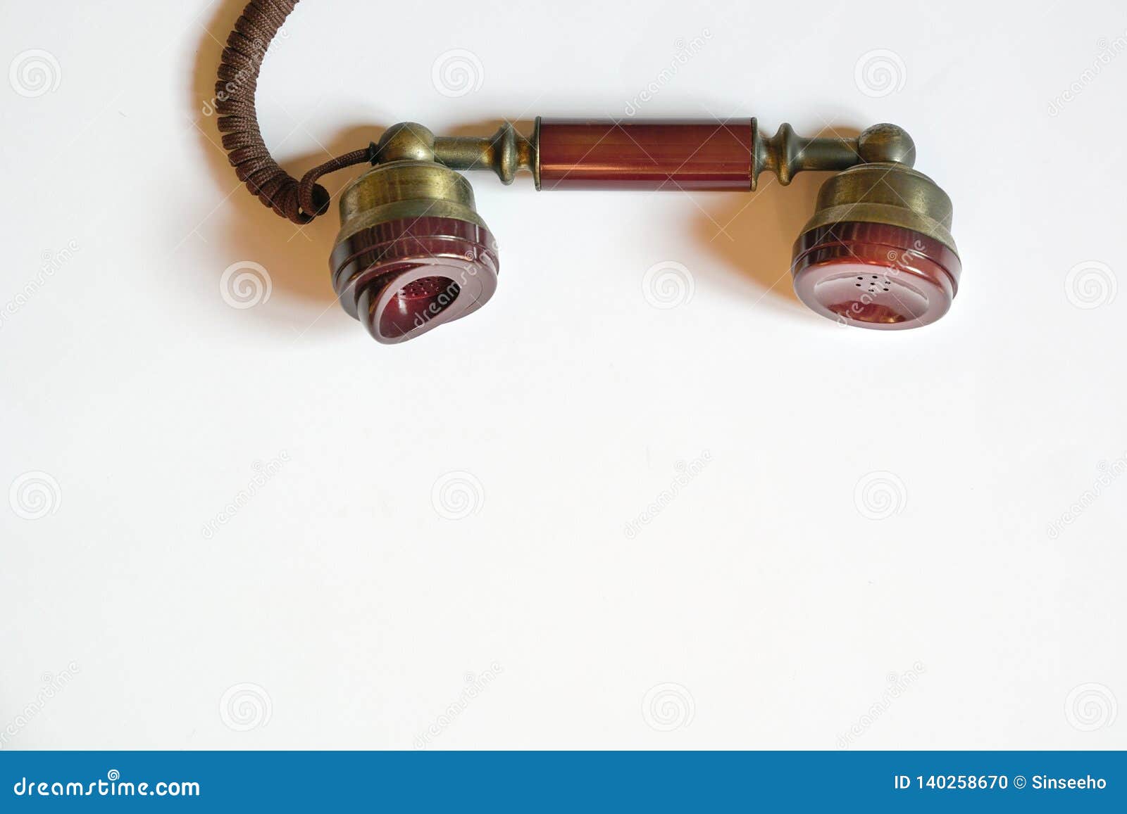 Communication Concept: Phone Receiver Dangling from Top with Copy Space ...