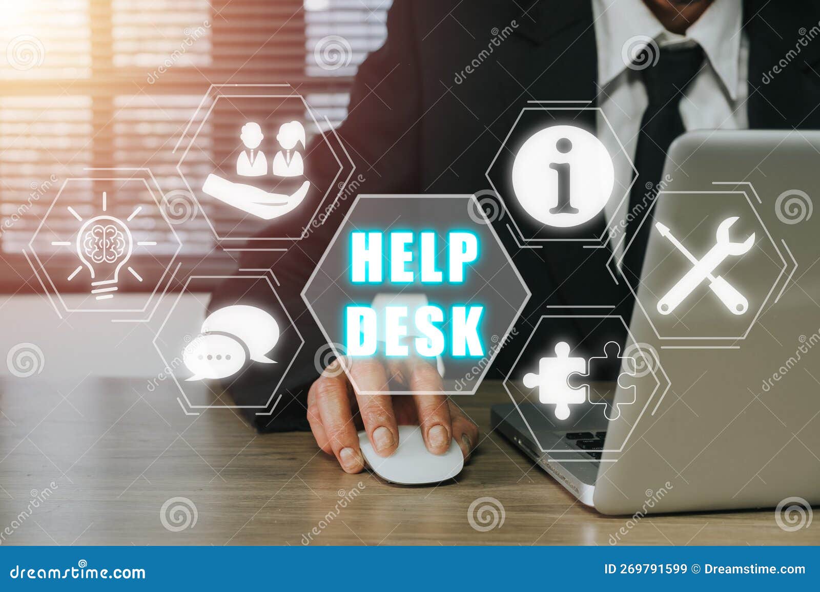 Person Using Laptop Computer on Office Desk with Help Desk Icon on ...