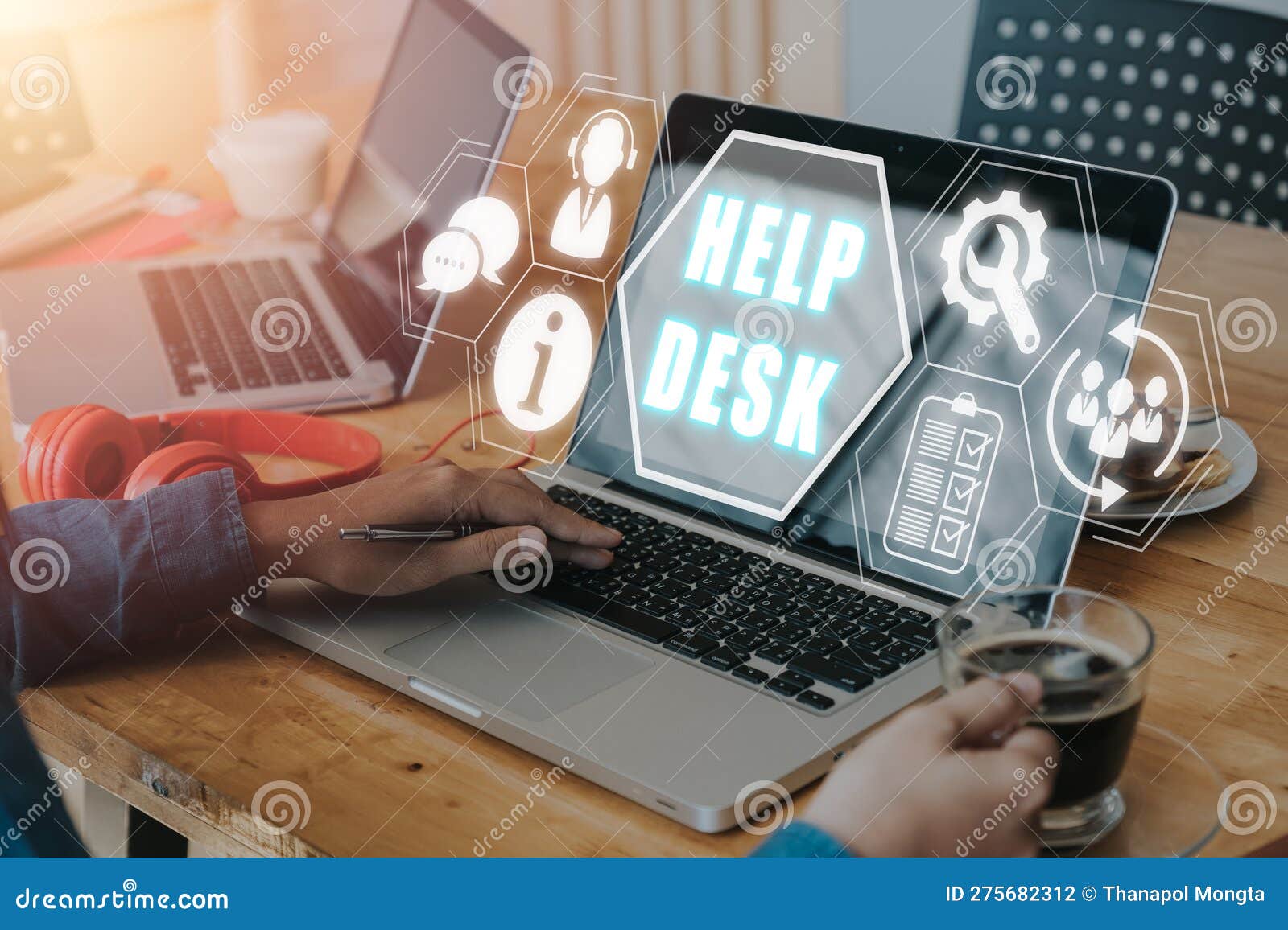 Person Working on Laptop Computer with Help Desk Icon on Virtual Screen ...