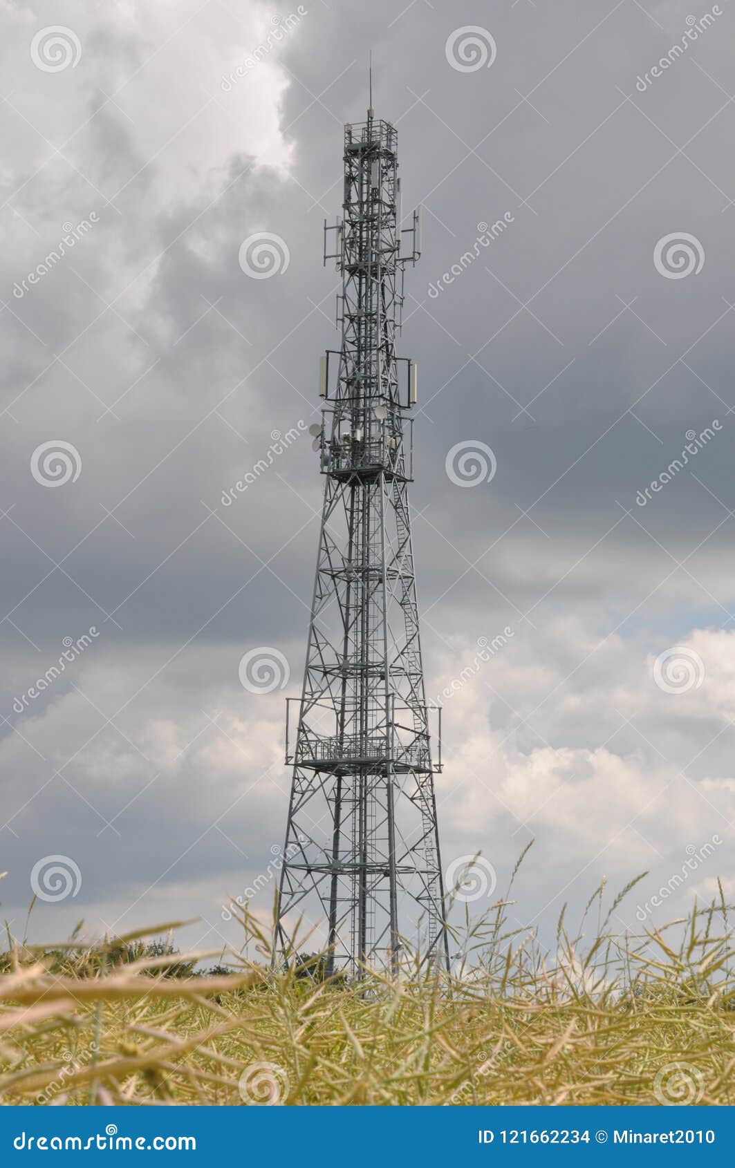 Communication Tower on a Field Stock Photo - Image of nature ...