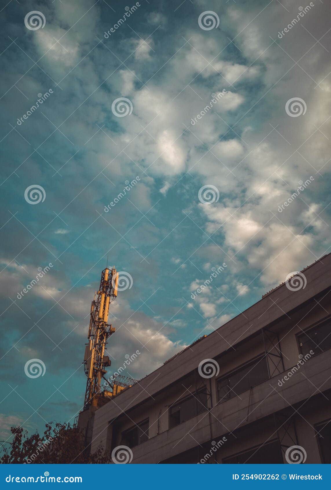 Communication Tower on a Rooftop of a Building, Vertical Stock Photo ...