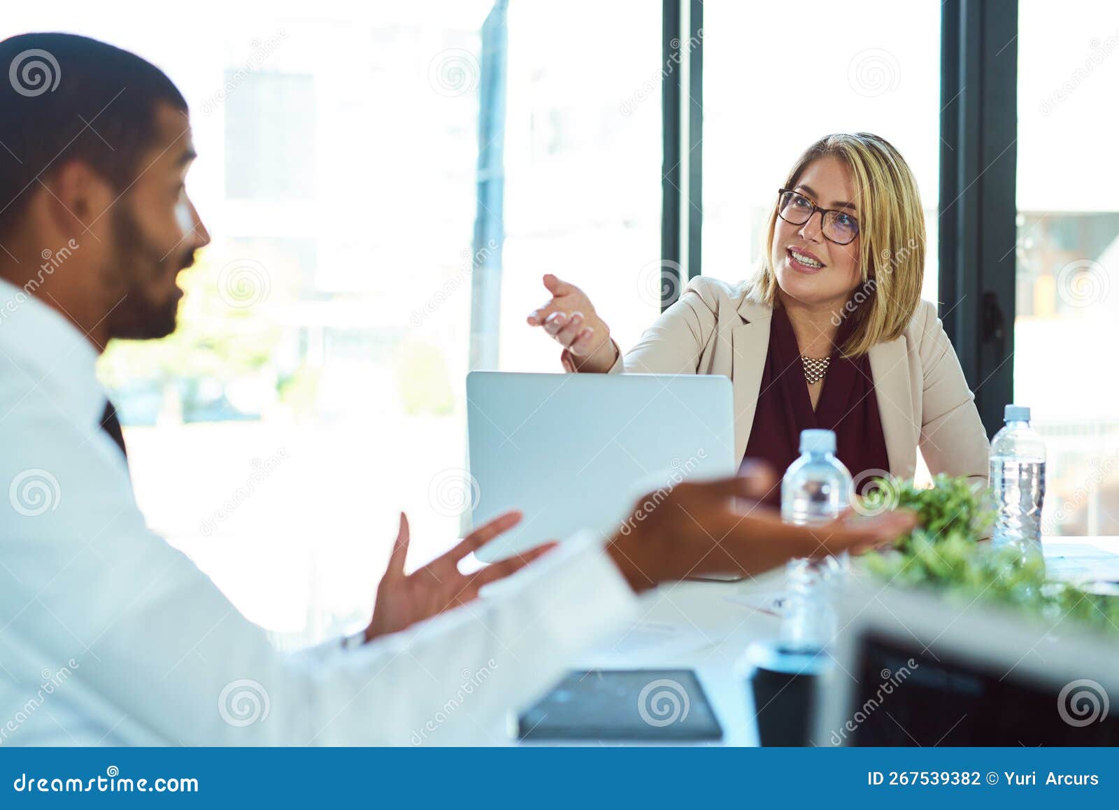 Communication at Work is Important. Businesspeople in the Workplace ...