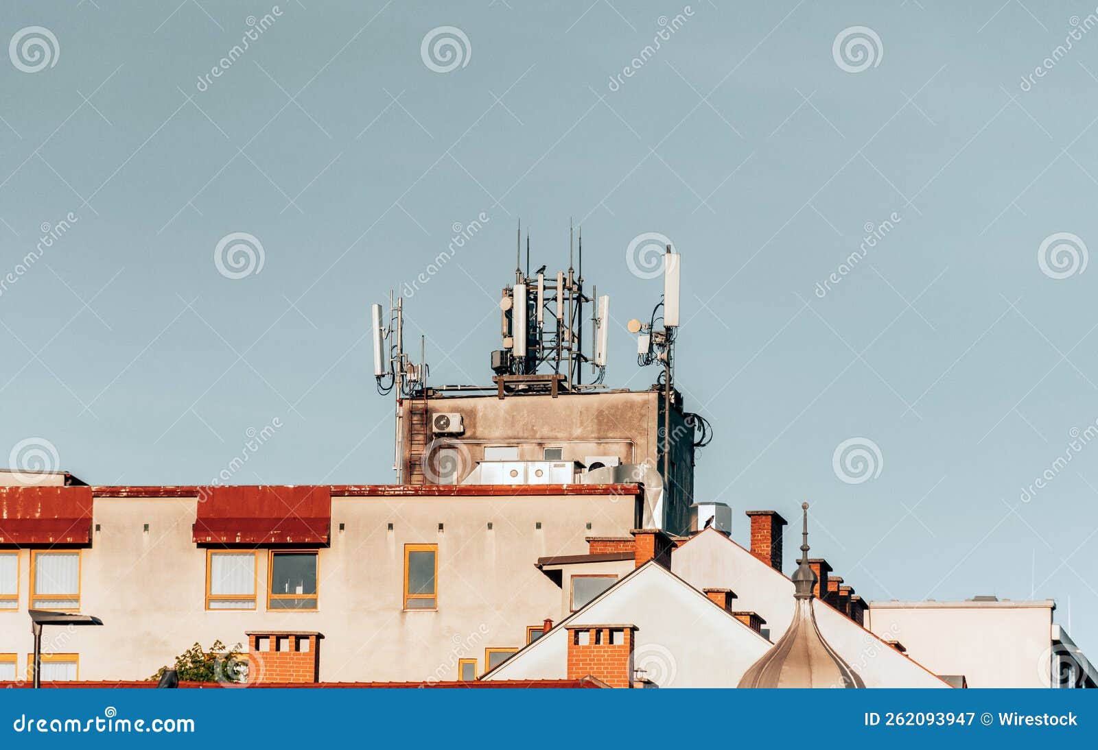 Cluster of Mobile Network Broadcast Cell Repeaters on Roof of Building ...