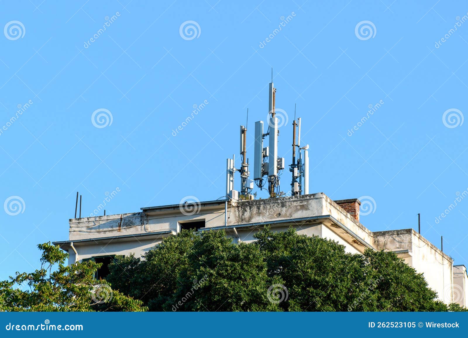Cluster of Mobile Network Broadcast Cell Repeaters on Roof of Building ...