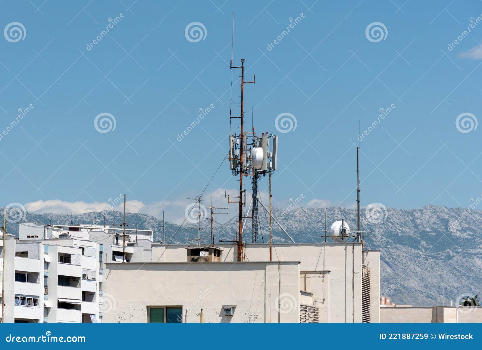 Cluster of Mobile Network Broadcast Cell Repeaters on Roof of Building ...