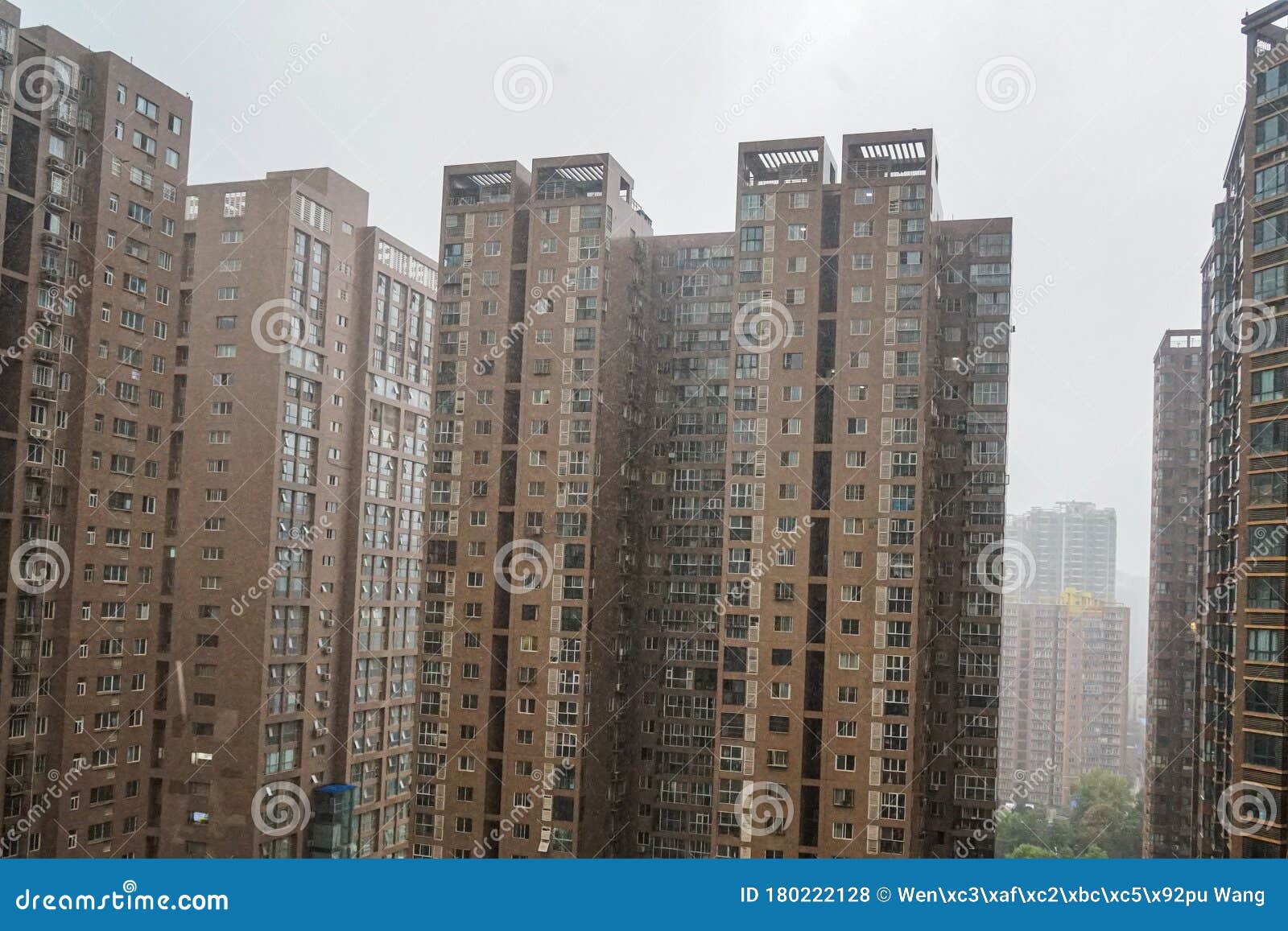 Community Scene Under Heavy Rain Stock Photo - Image of skyscrapers ...