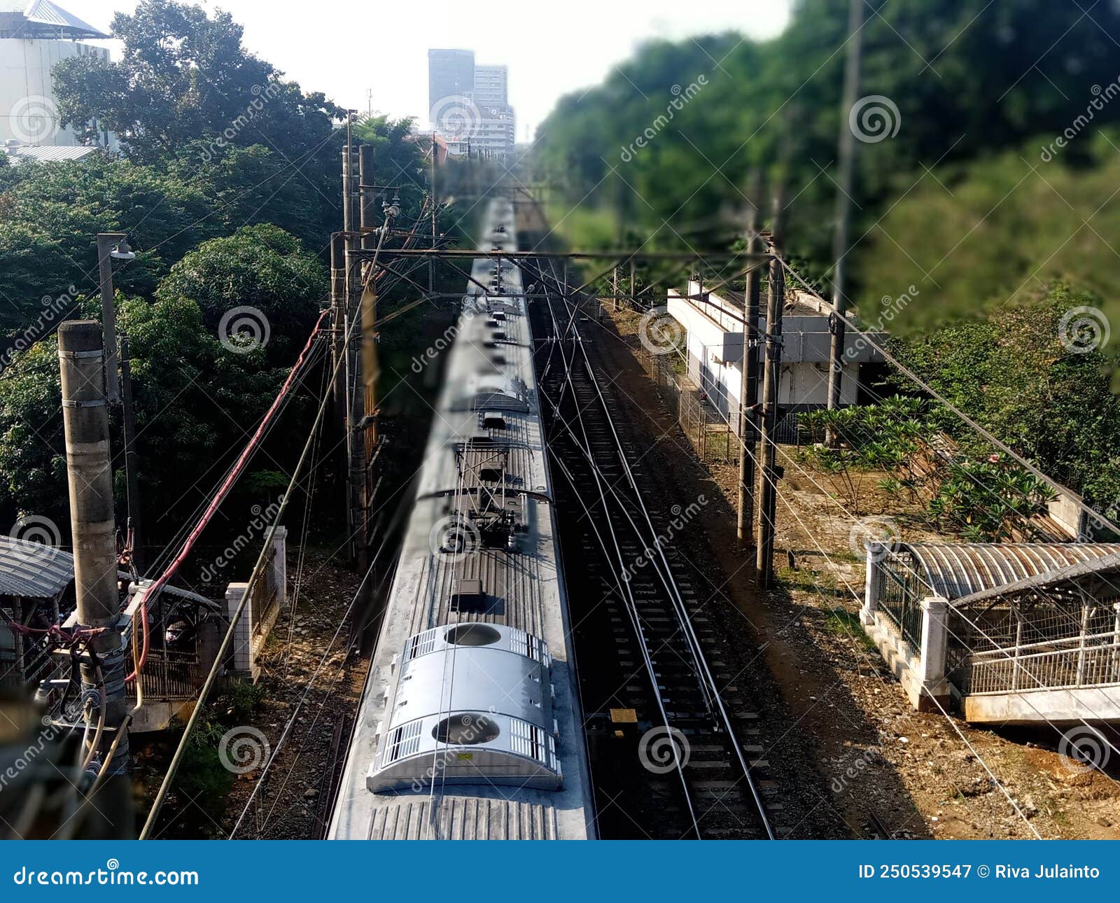 Commuter line passes by stock image. Image of track - 250539547