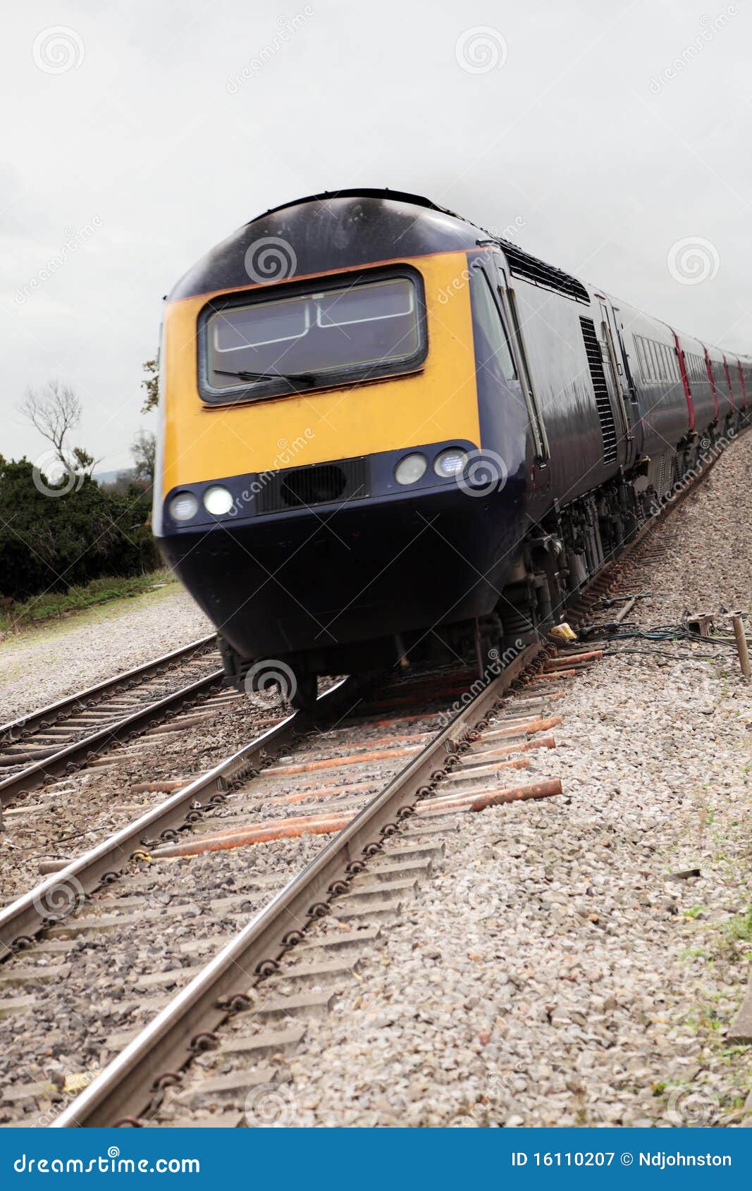 Commuter train approaching stock image. Image of train - 16110207