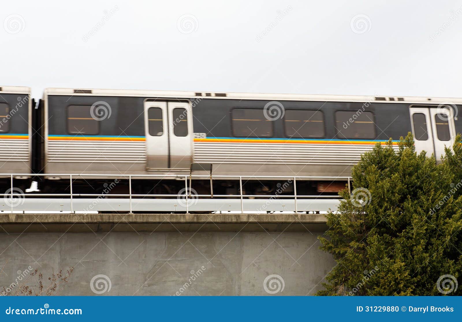 Commuter Train Speeding Past Stock Photo - Image of concrete ...