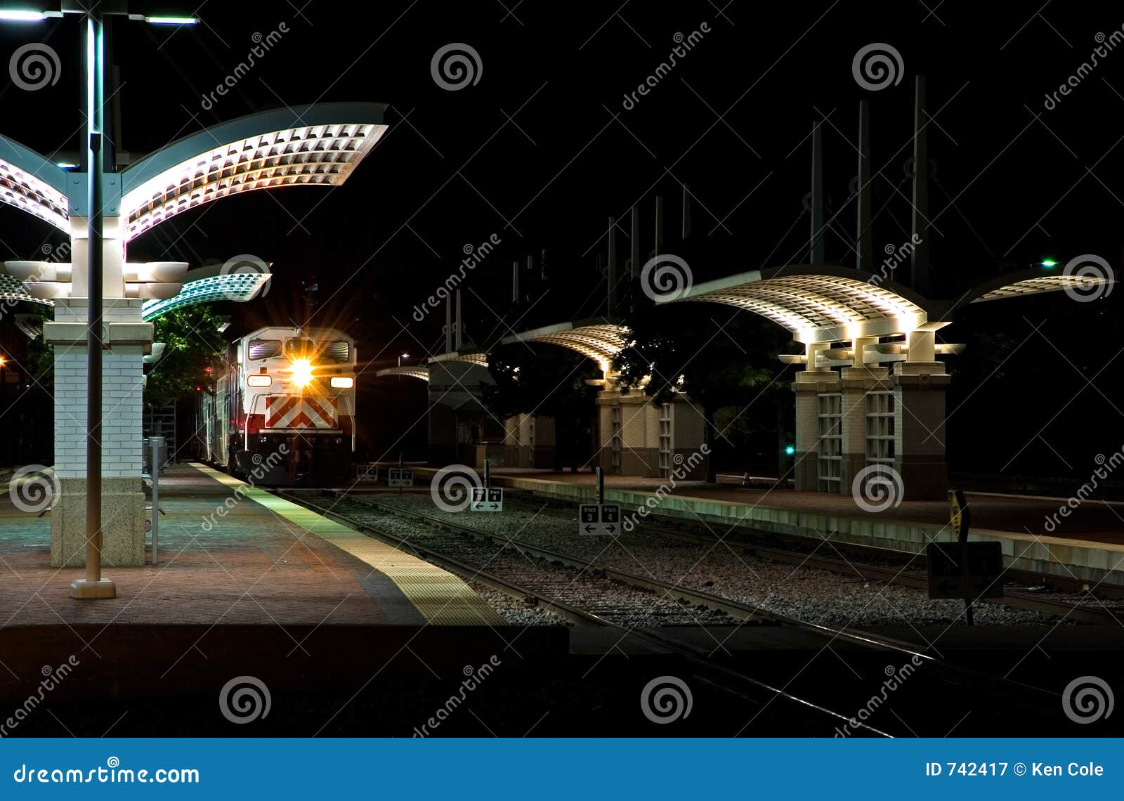 Commuter Train Station at Night Stock Image - Image of lights, platform ...