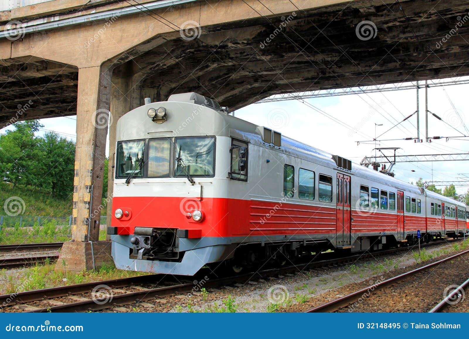Commuter Train Under Bridge Stock Image - Image of architecture ...