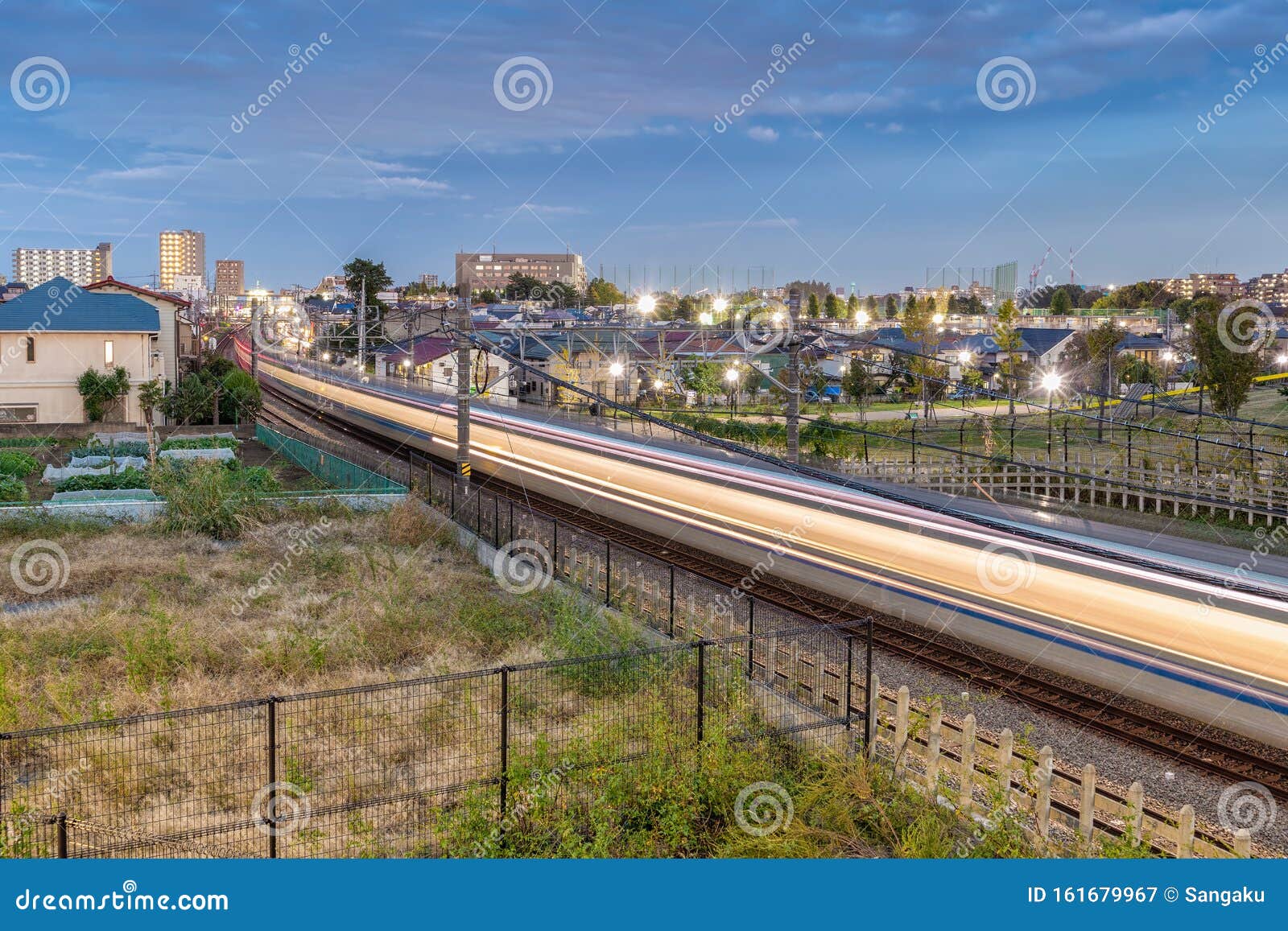 Commuter Train in Western Tokyo at Night Stock Image - Image of homes ...
