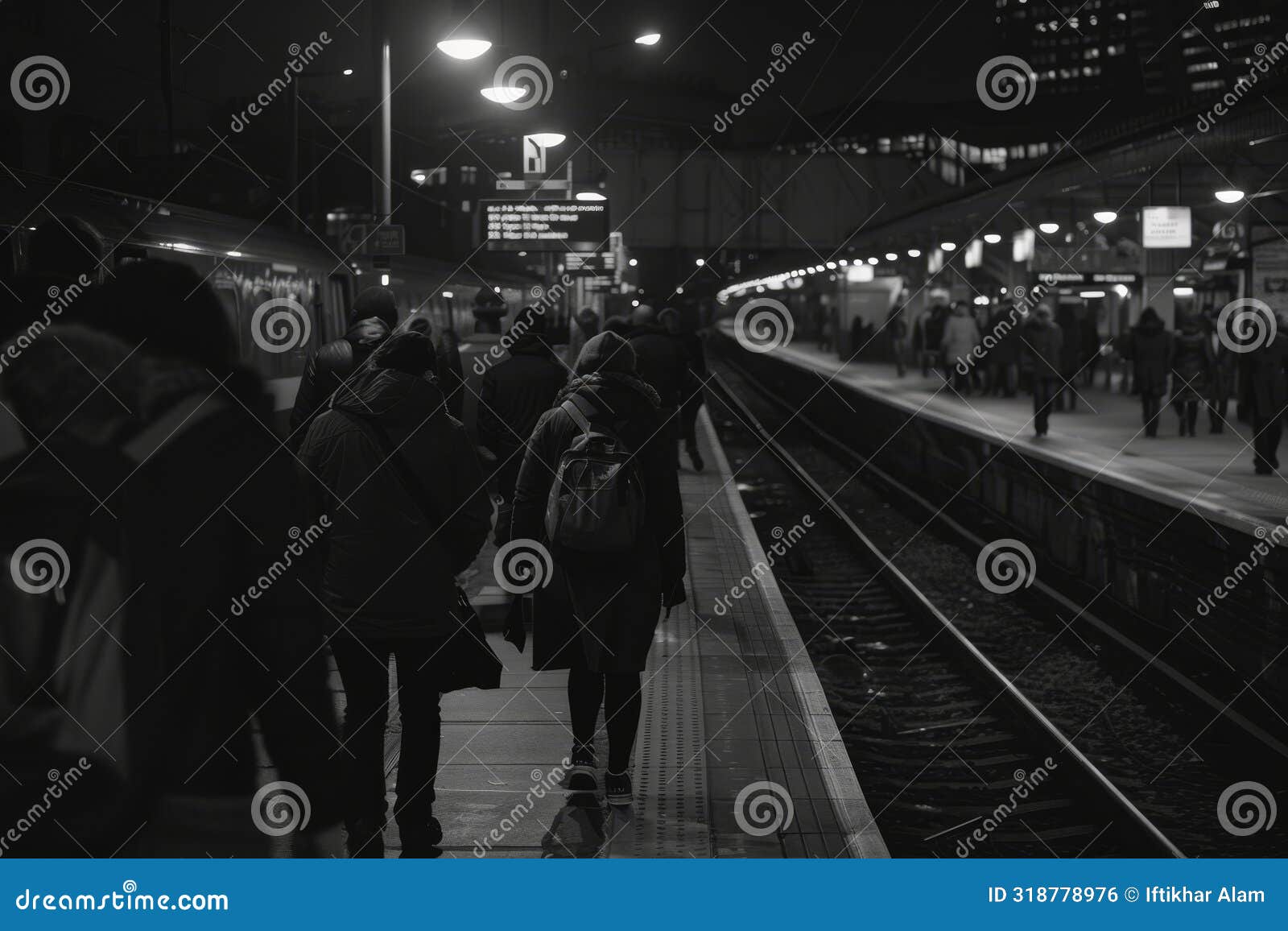 Commuters Walking on a Busy Train Platform at Night, Commuters Walking ...