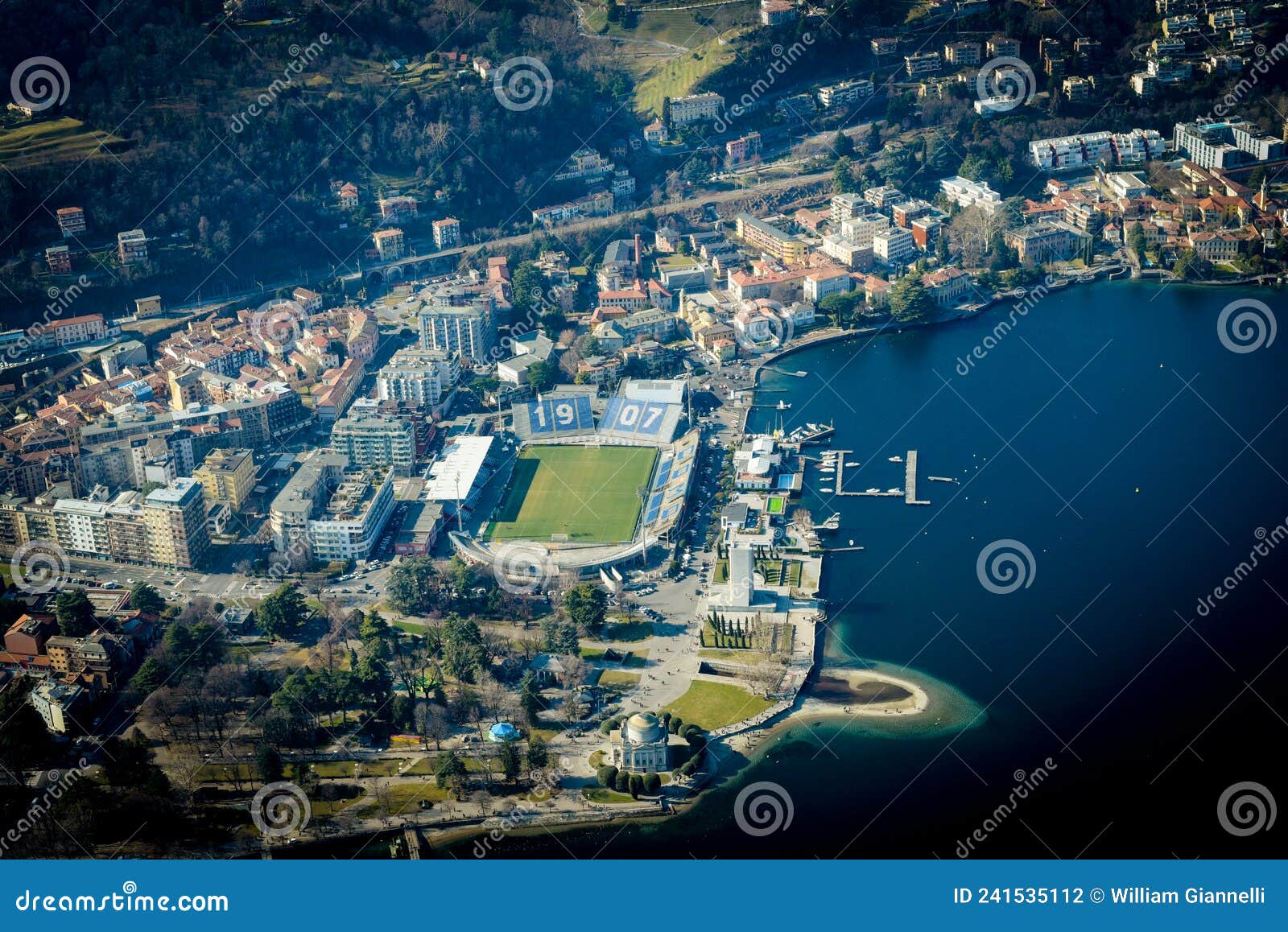 Como lake and stadium stock photo. Image of water, skyline - 241535112