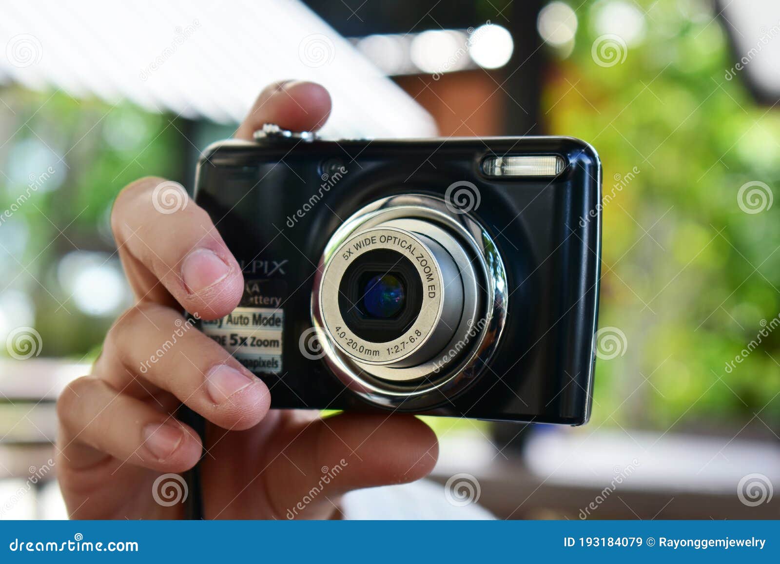 A Compact Black Digital Camera that Still Captures Beautiful and Sharp ...
